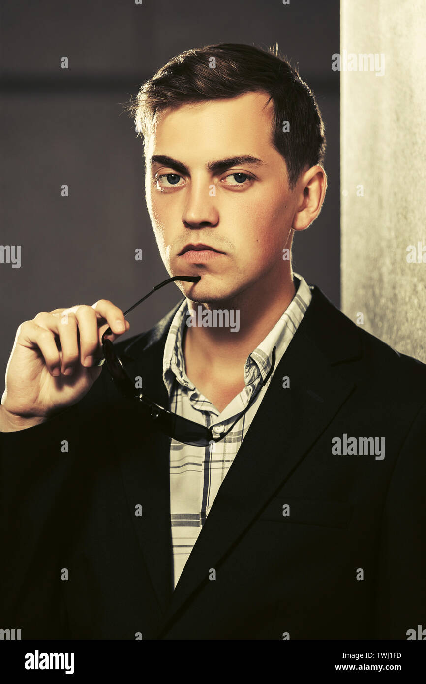 Male model in black suit hi-res stock photography and images - Alamy