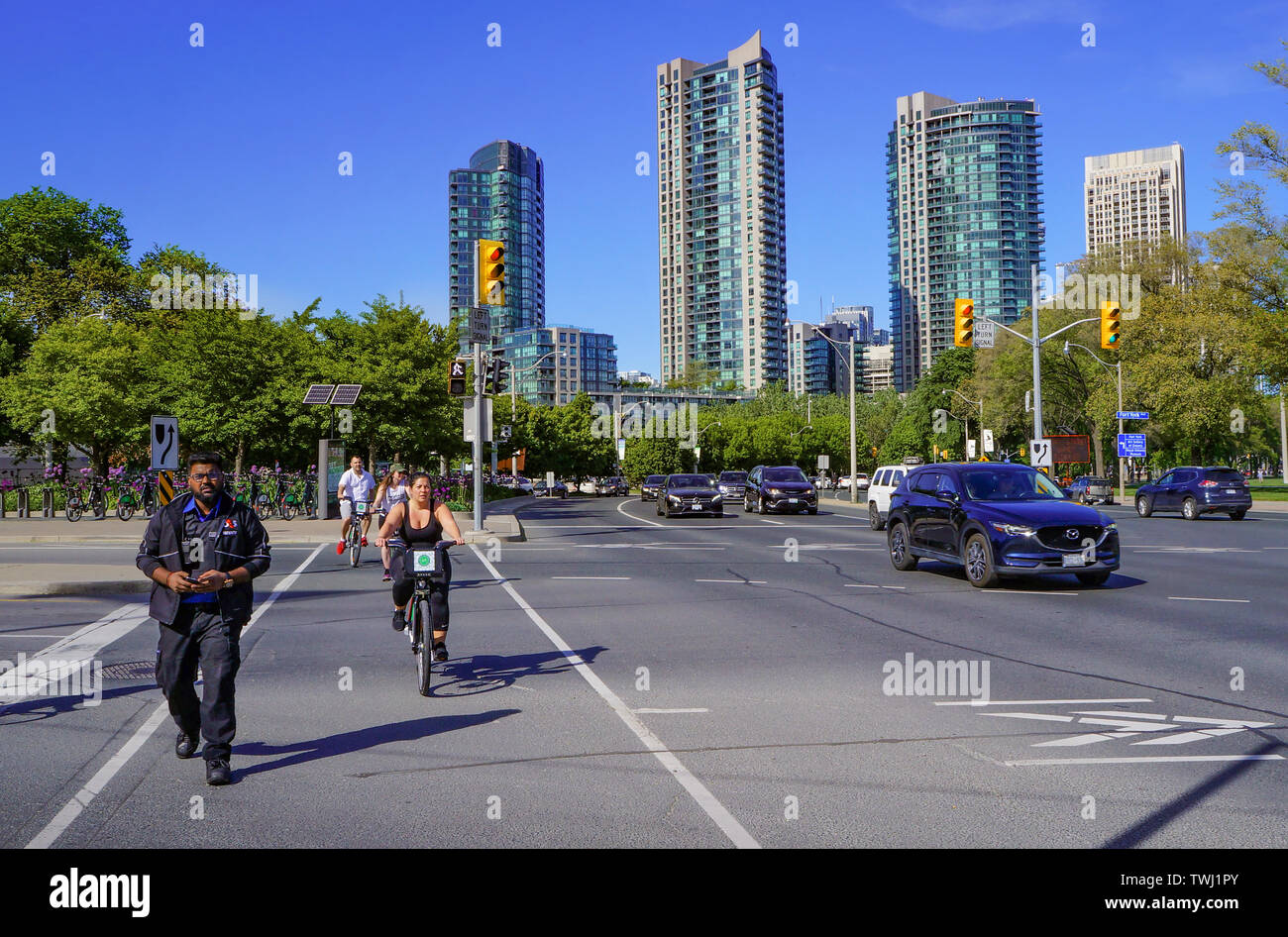 Toronto, Canada - 06 09 2019: Pedestrians and cyclists crossing the ...