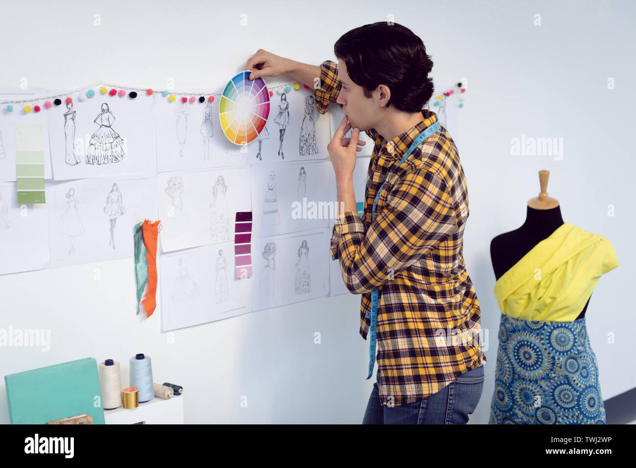 Young man fashion designer hi-res stock photography and images - Alamy