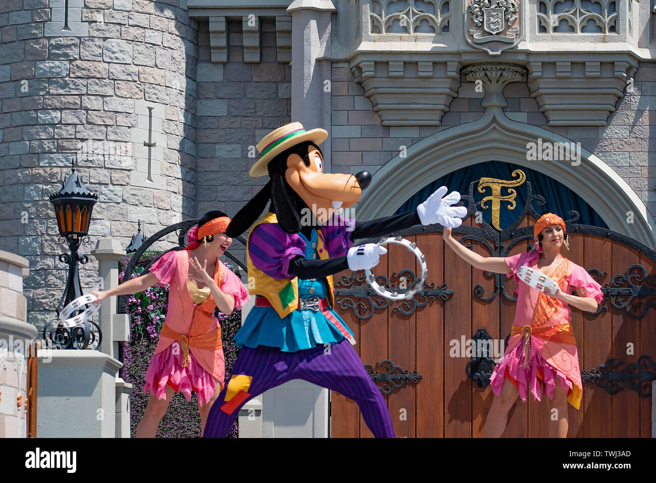 Orlando, Florida. May 10, 2019. Goofy dancing with The princess and the ...