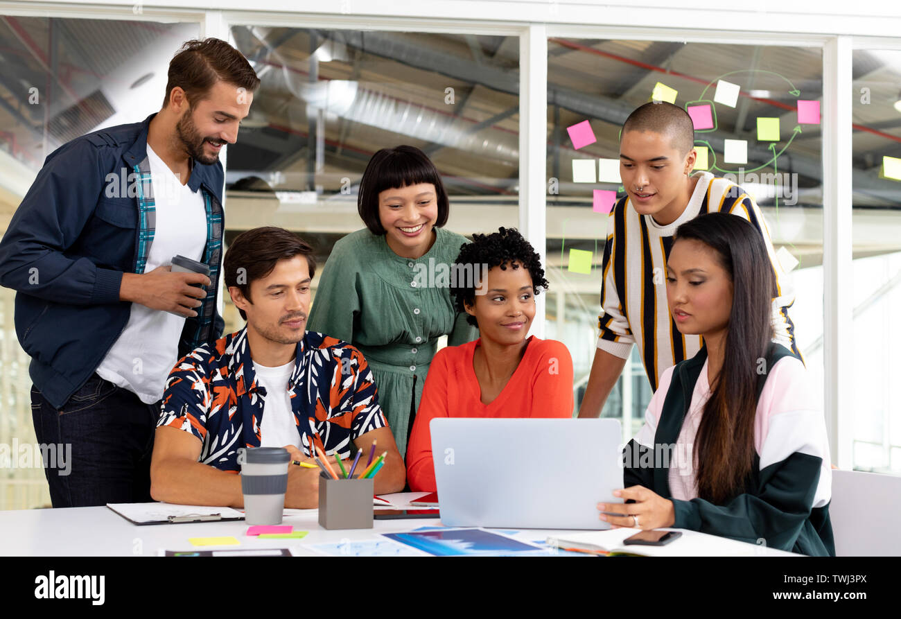 Business people discussing over laptop in the conference room Stock ...