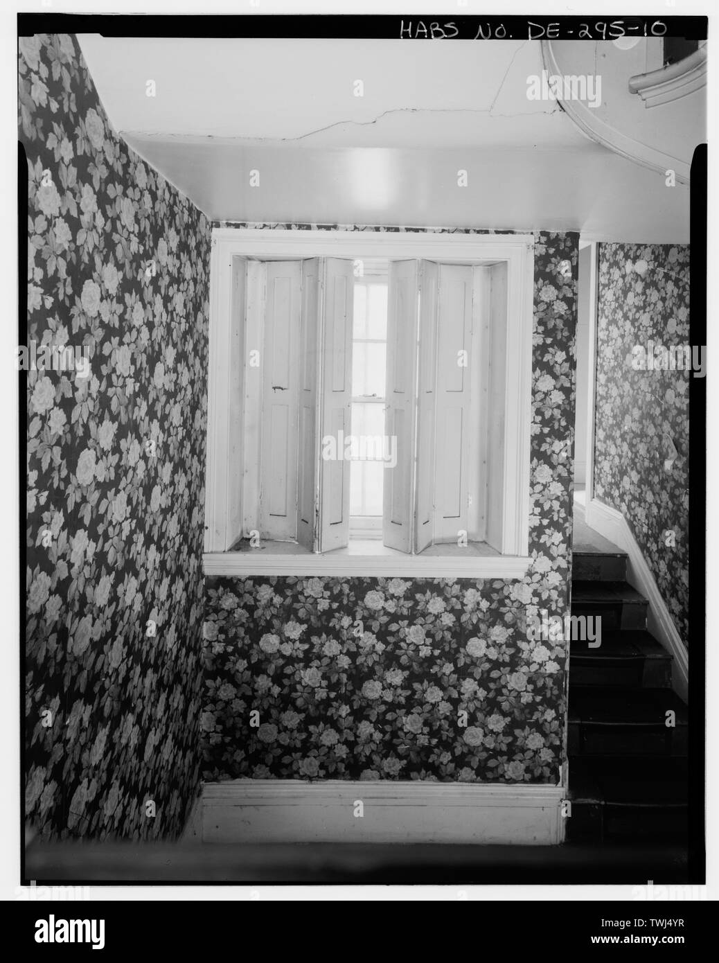 Second floor- view of window on west wall of stair landing looking west ...