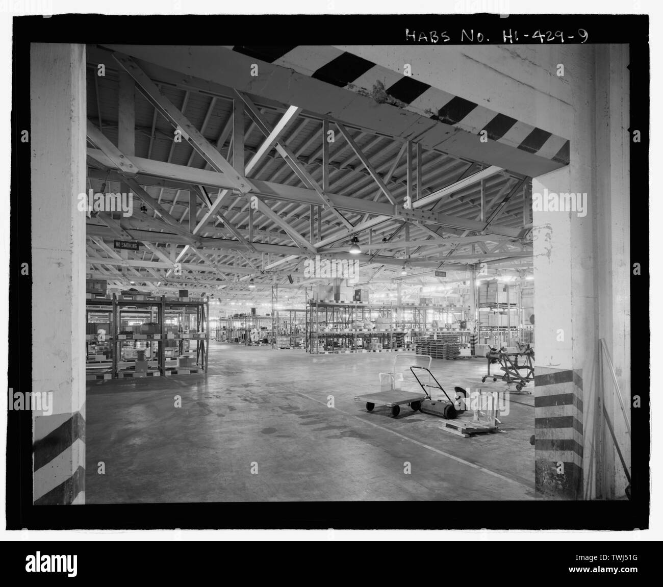 Second-floor interior view through firewall door to north end of ...