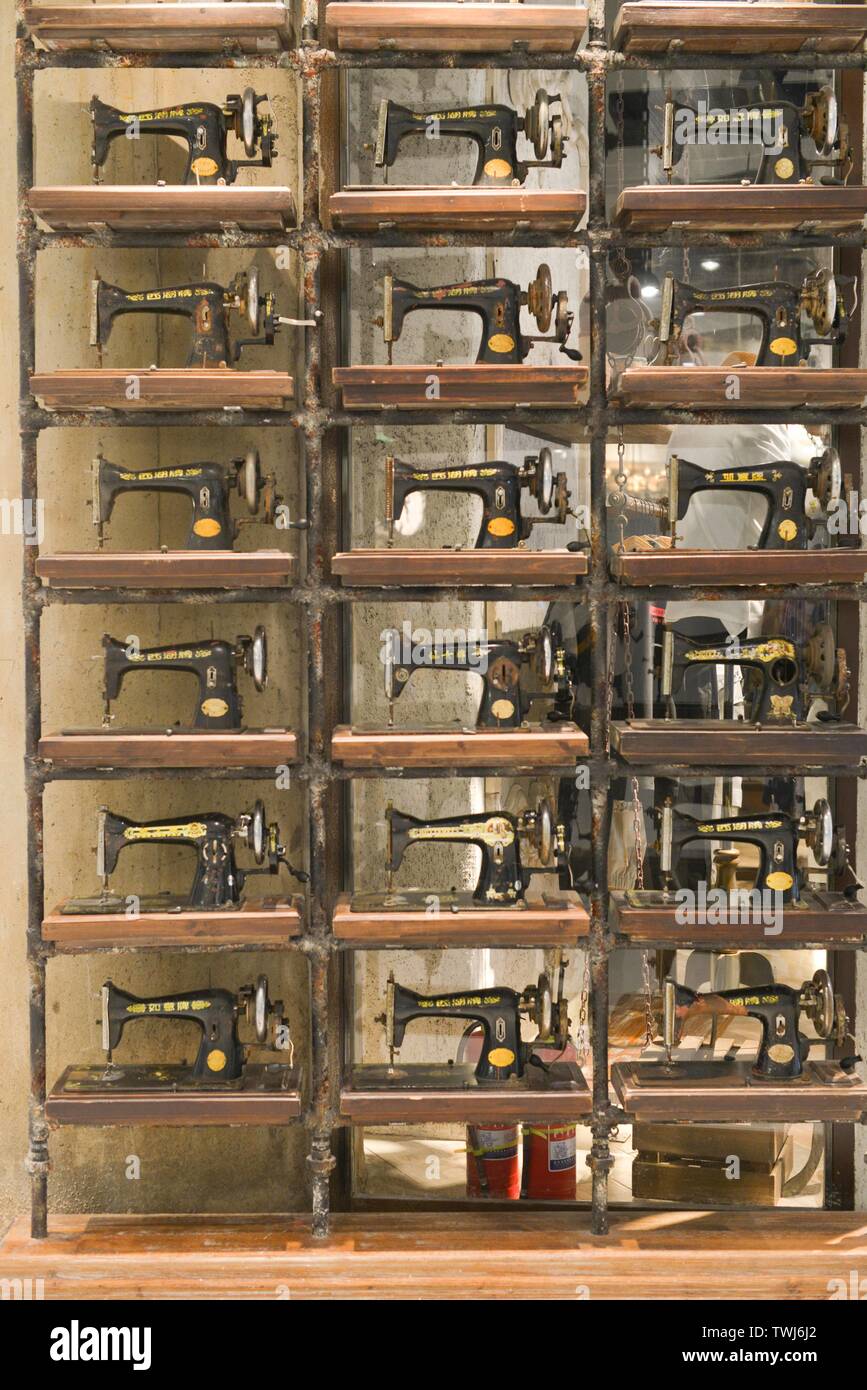 Sewing machine background wall Stock Photo - Alamy