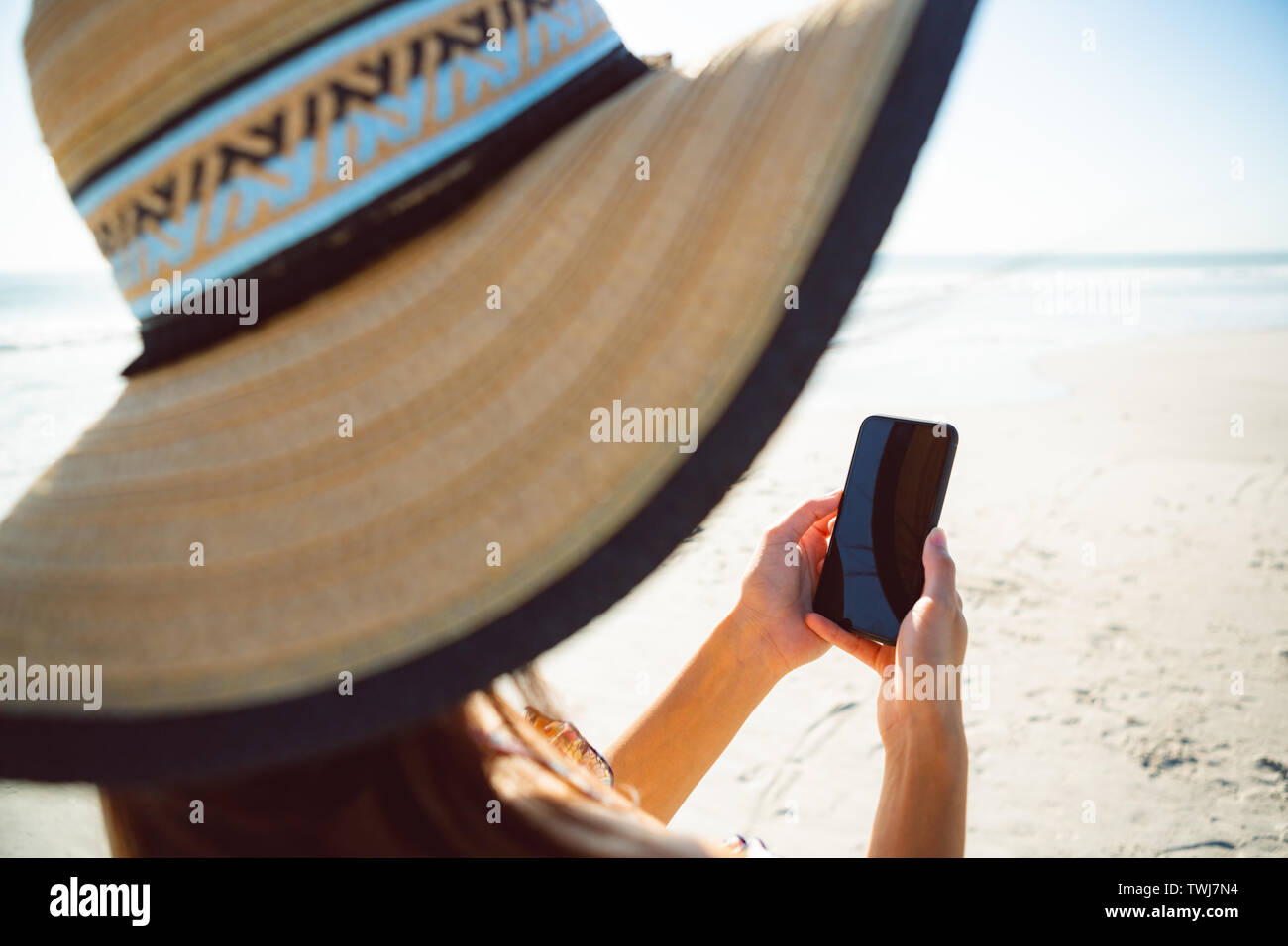 Woman in hat using hi-res stock photography and images - Alamy