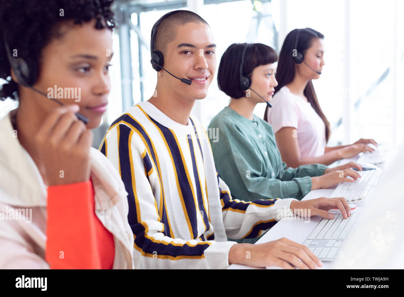 Speaking into computer hi-res stock photography and images - Alamy