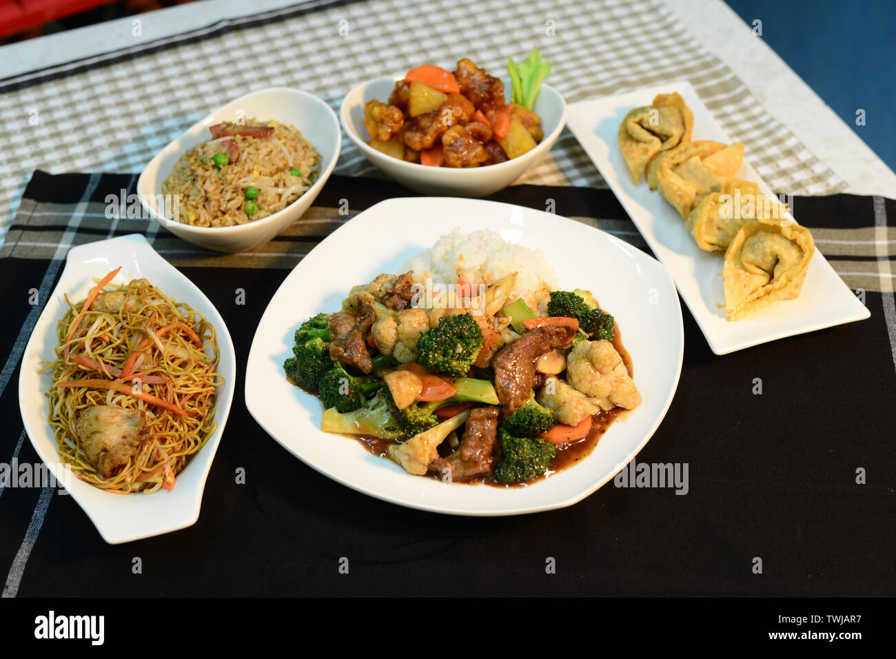 Chinese cuisine, setup nicely on table ready to serve Stock Photo - Alamy