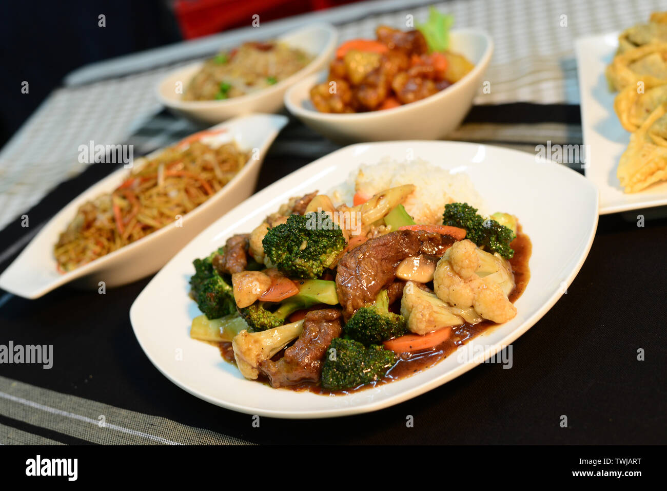 Chinese cuisine, setup nicely on table ready to serve Stock Photo - Alamy