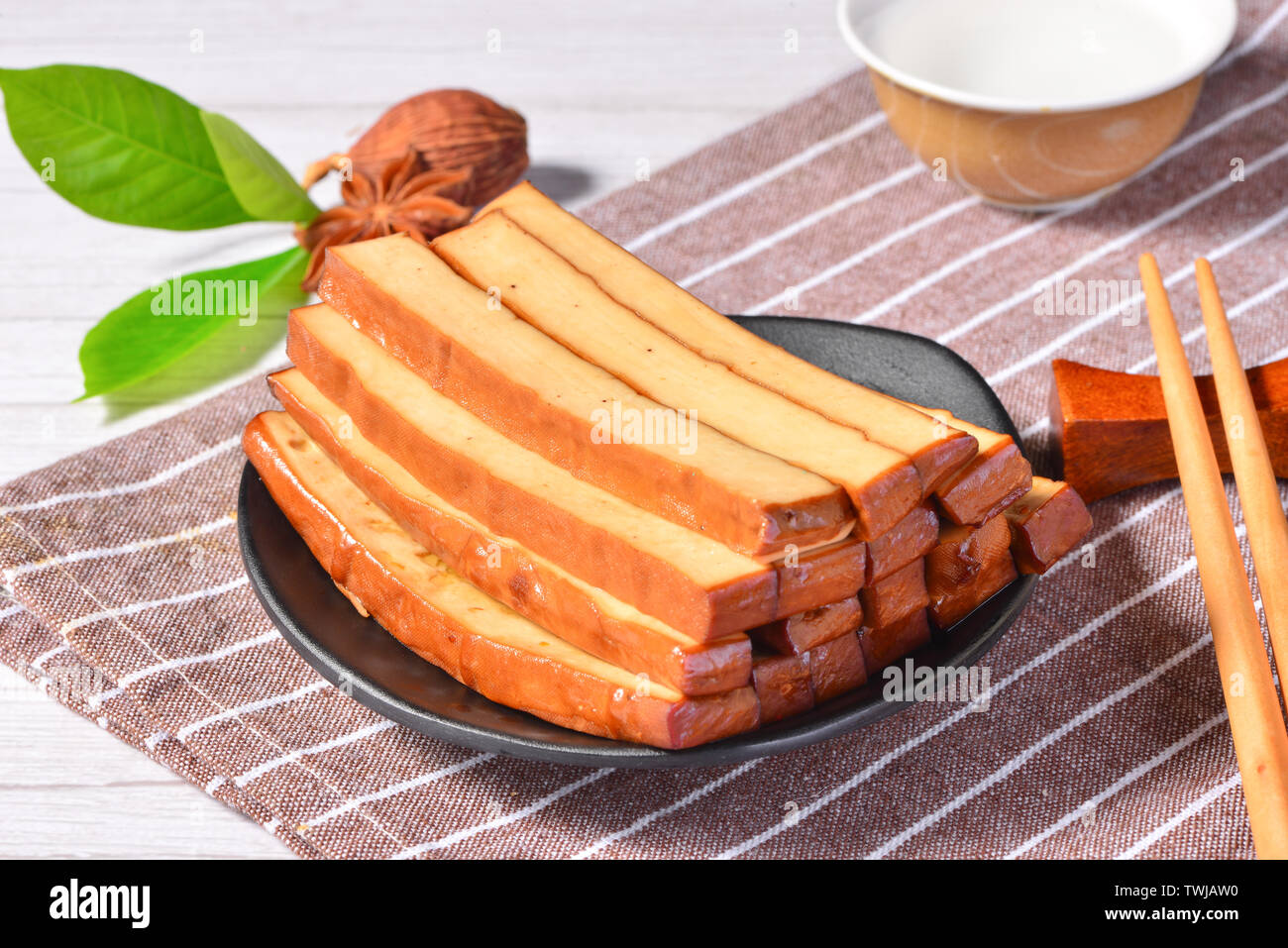 Spiced dried tofu Stock Photo - Alamy