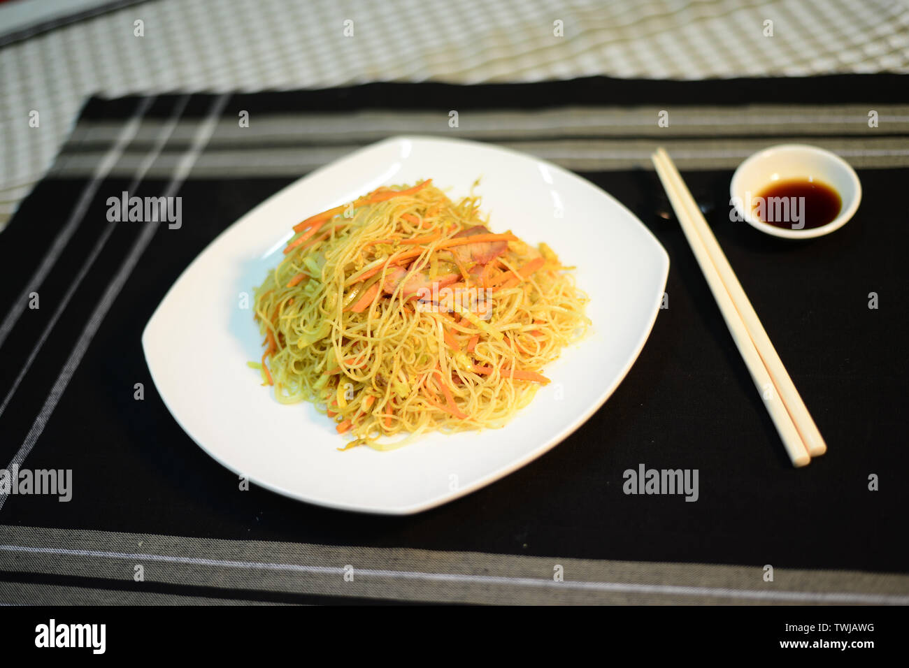 Singapore style fried rice noodle, setup nicely on a table ready to ...
