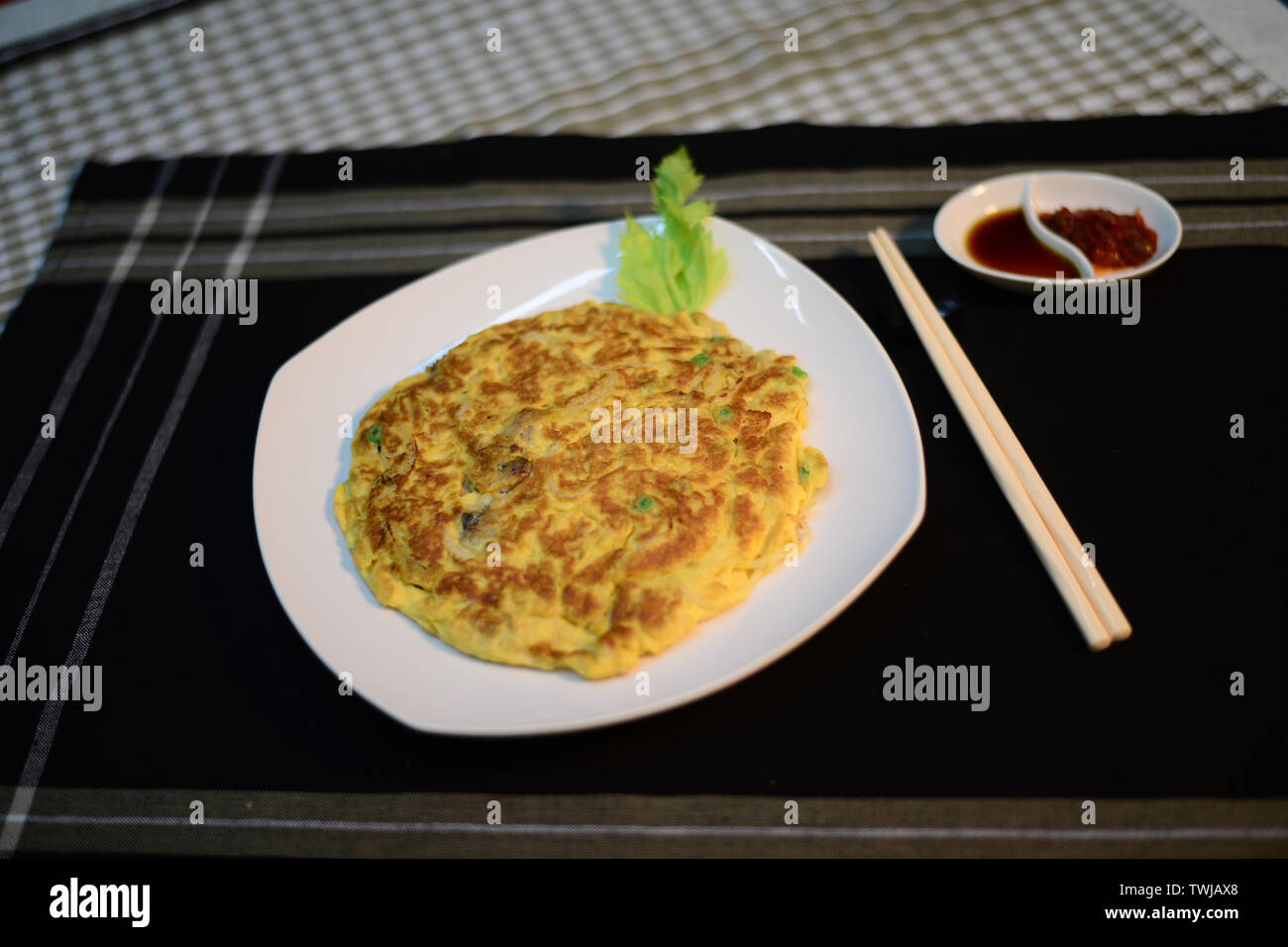 Chinese egg fu young, setup nicely on a table ready to serve Stock ...