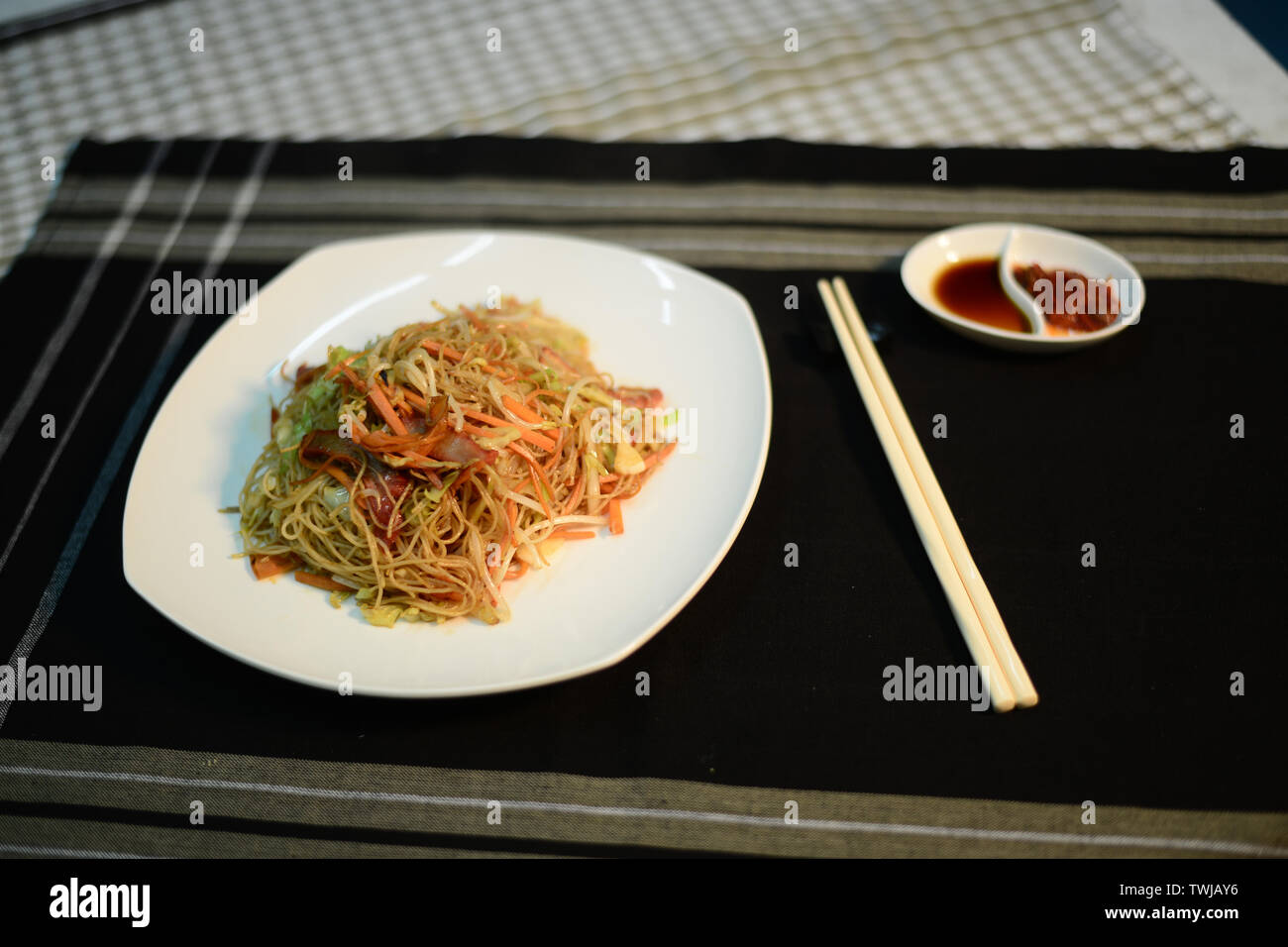 Chinese fried noodle, setup nicely on table ready to serve Stock Photo ...