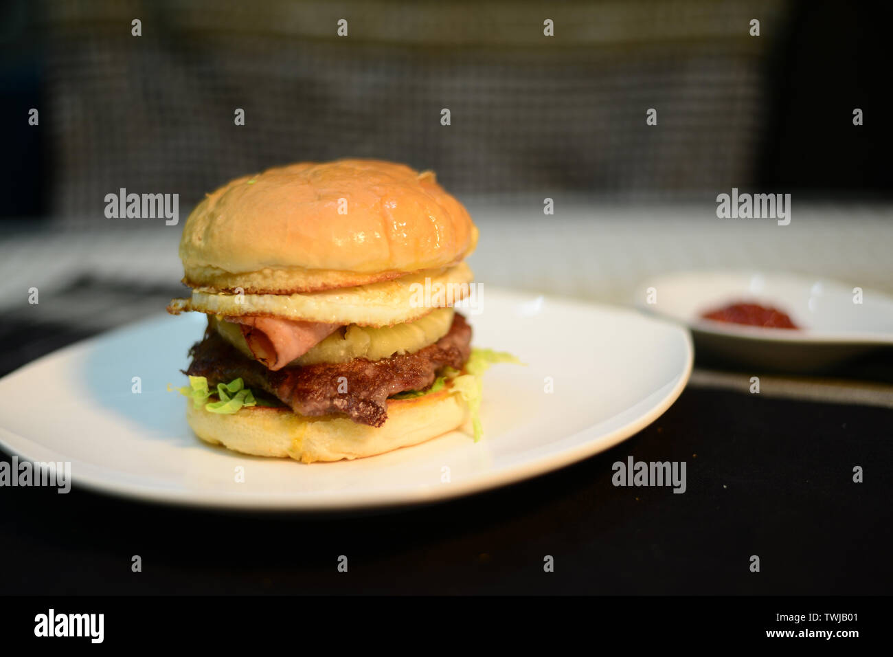 traditional takeaway hamburgers, setup nicely on table ready to serve ...
