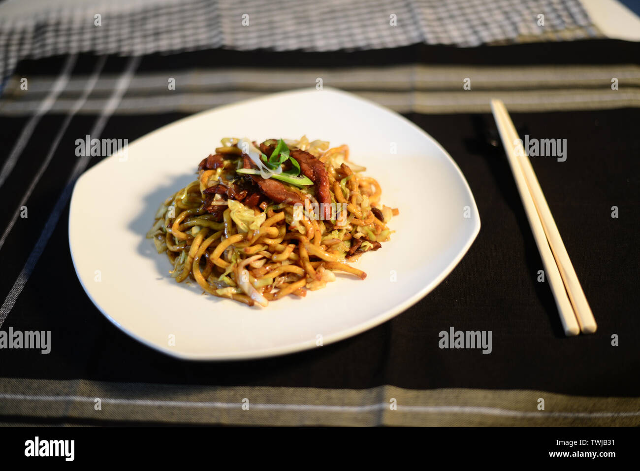 chinese fried rice noodle with beef, setup nicely on table ready to ...