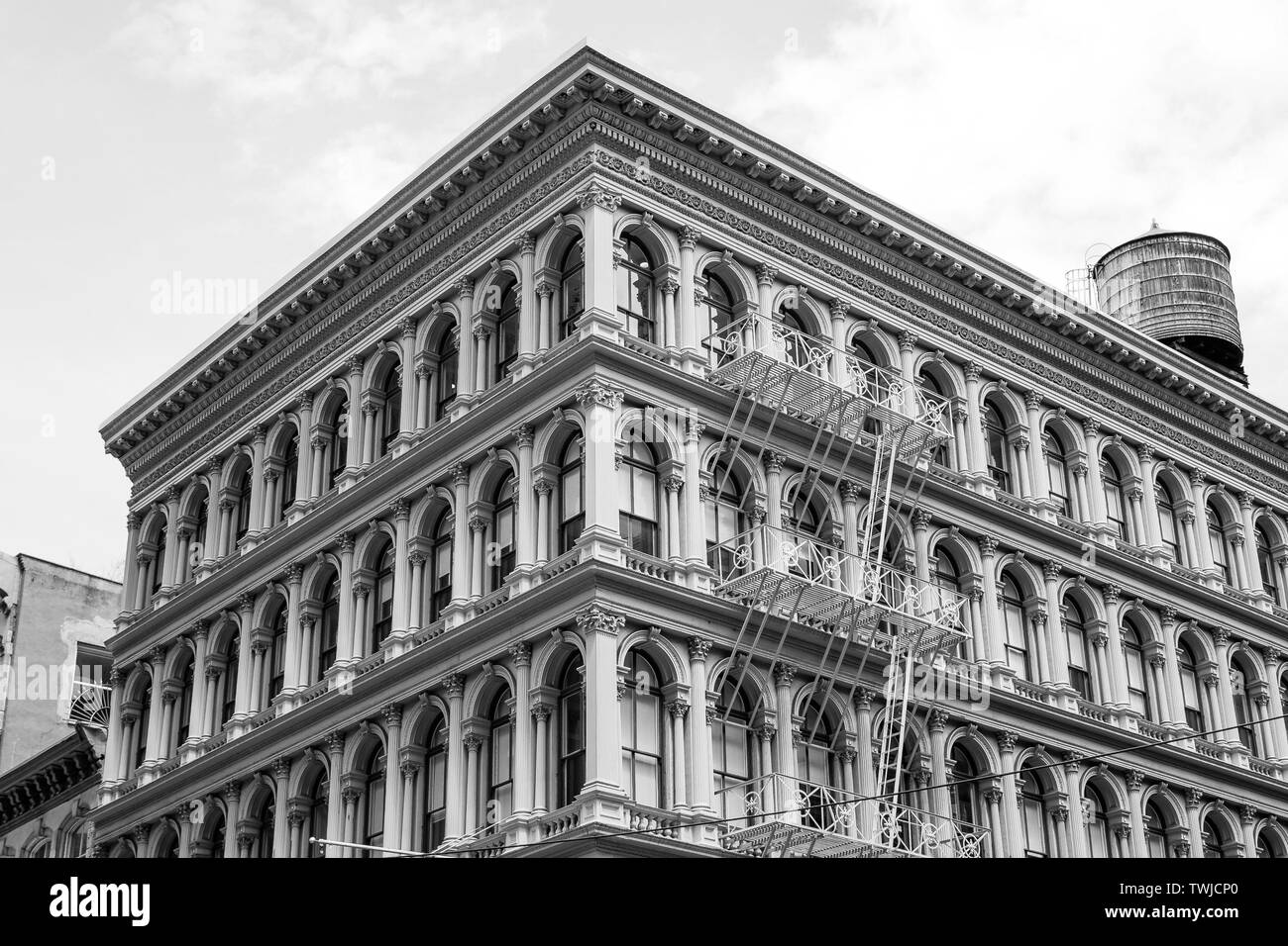 Typical SoHo building with a wooden water tank on the roof Stock Photo ...