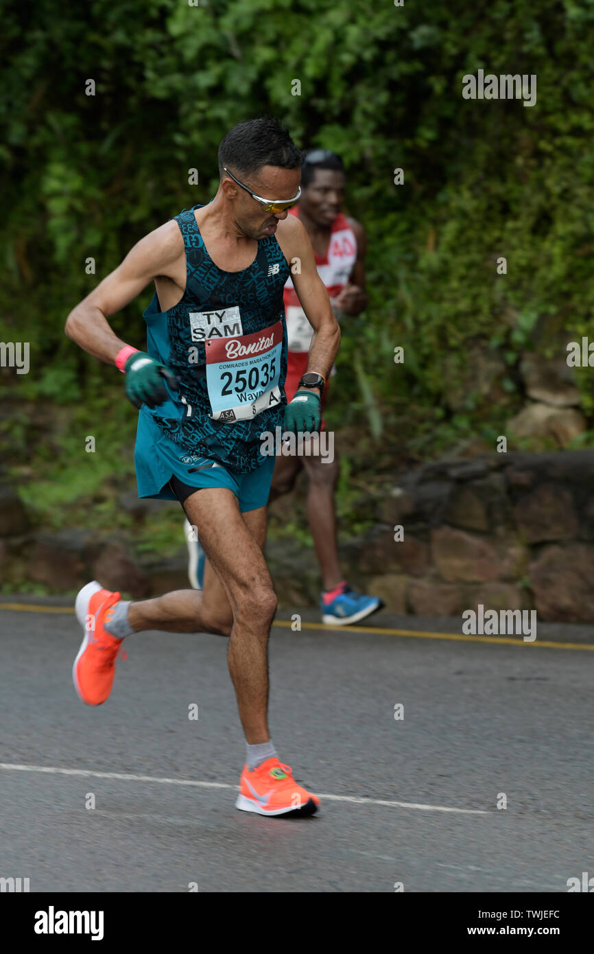 Durban, South Africa, adult man looking at watch while running, 2019 ...