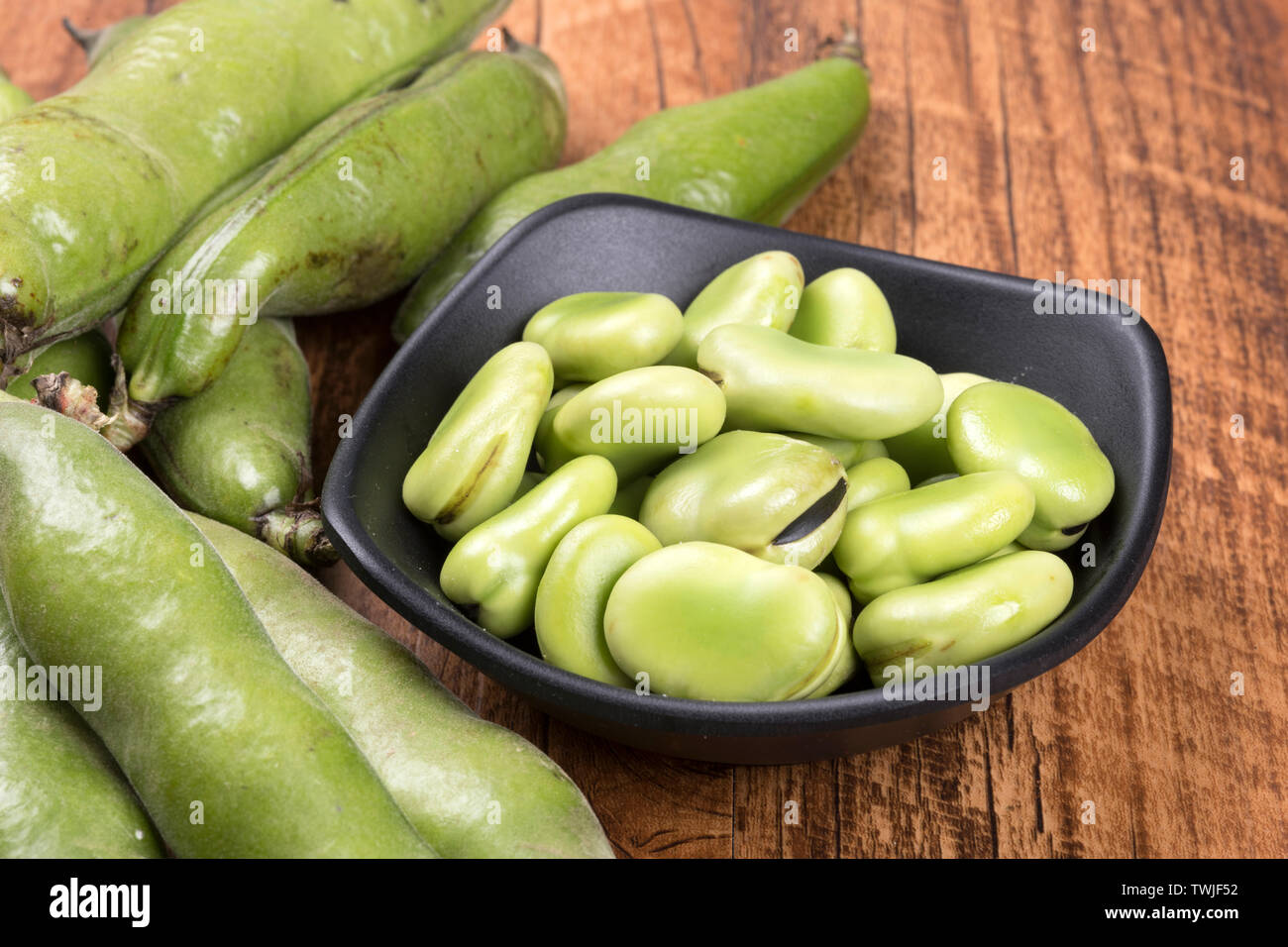Green broad beans Stock Photo - Alamy