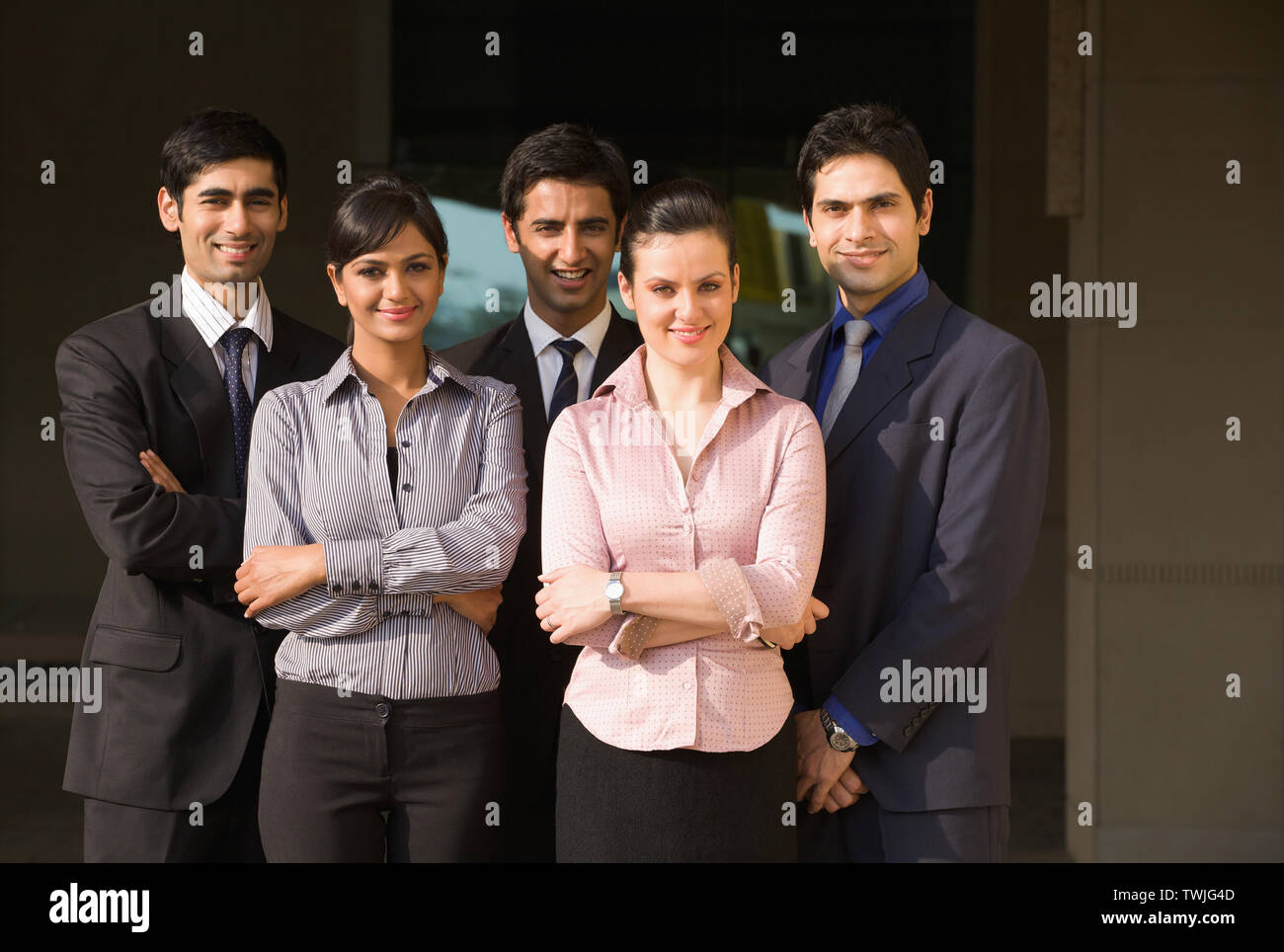 Business executives standing together Stock Photo - Alamy