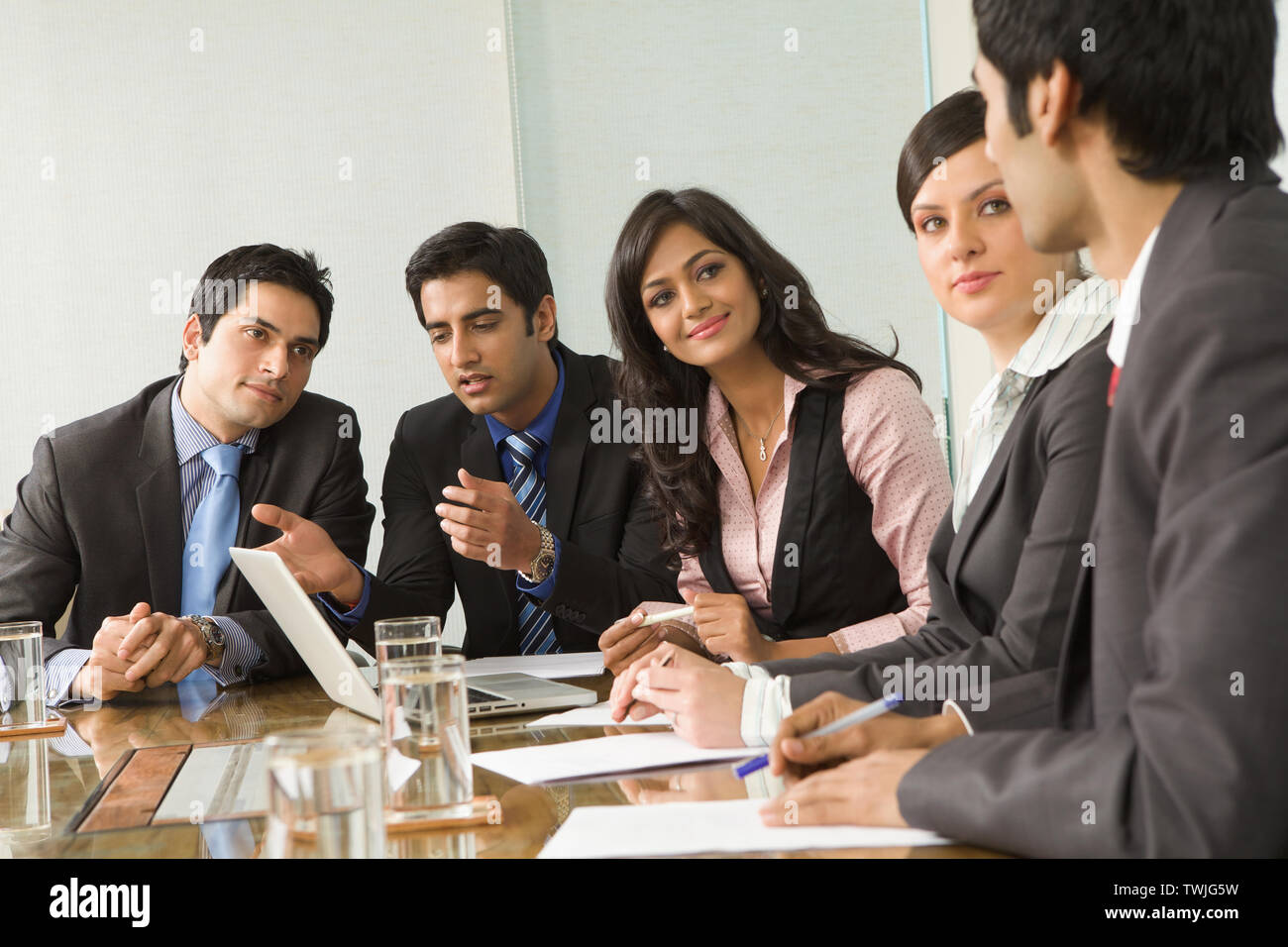 Business executives in an office meeting Stock Photo - Alamy