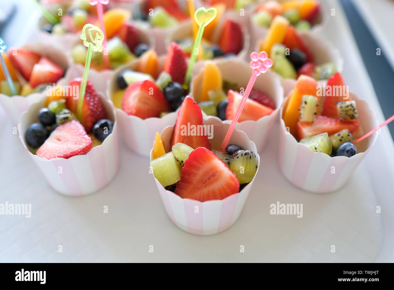 close up fruit cup, party food setup nicely on a table Stock Photo - Alamy