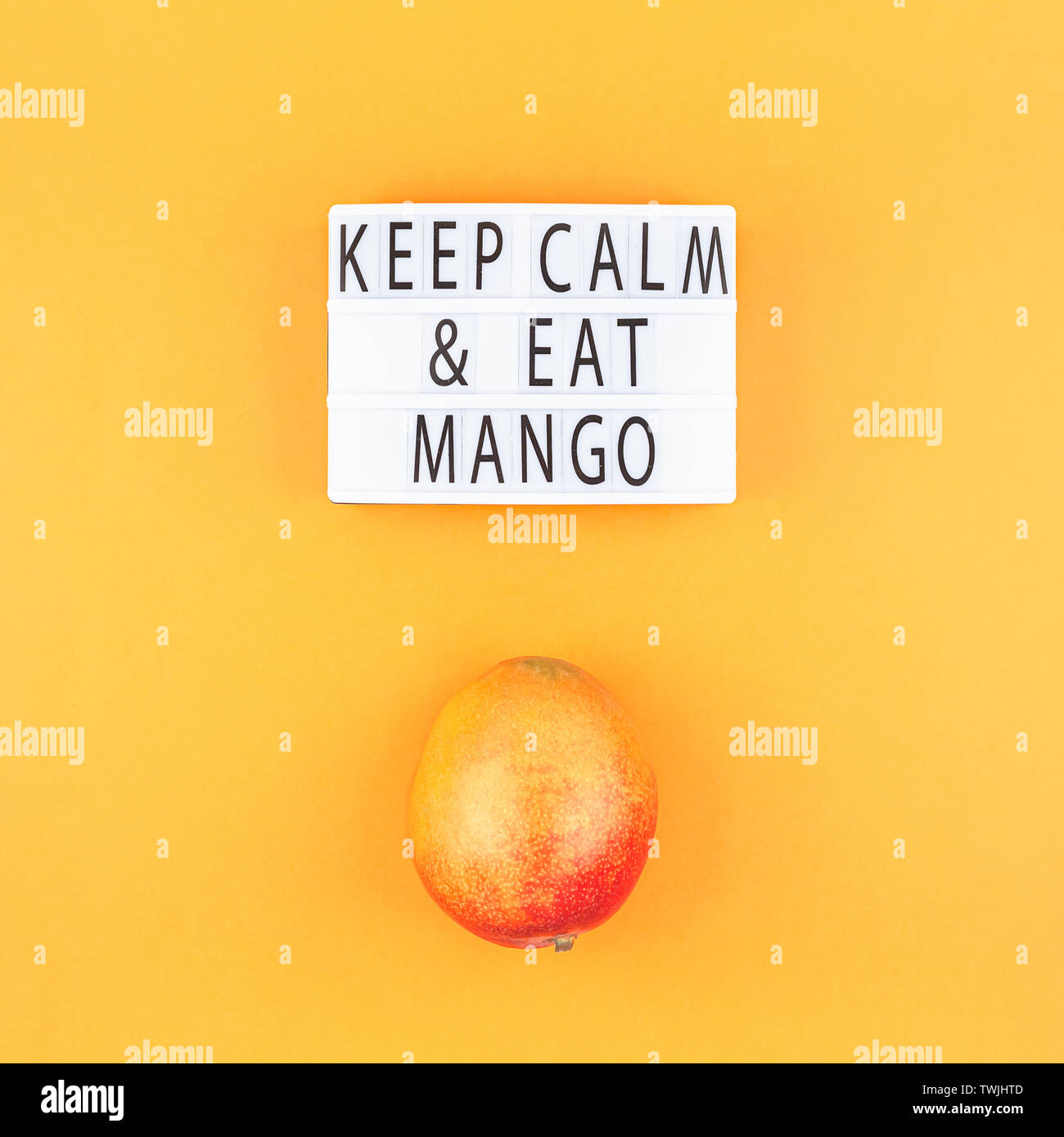 Mango fruit in creative conceptual top view flat lay composition with ...