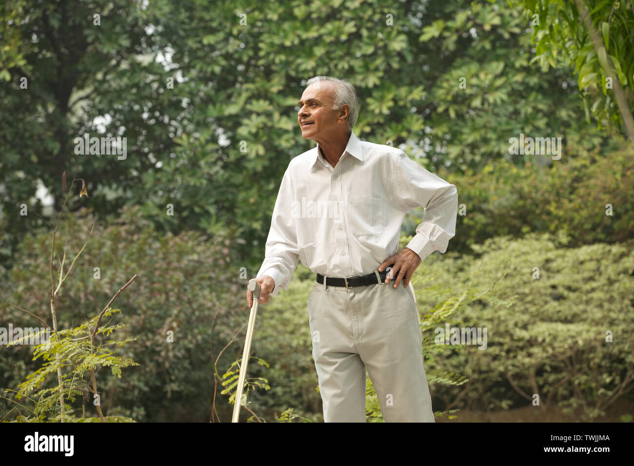 Old Man Walking With Cane