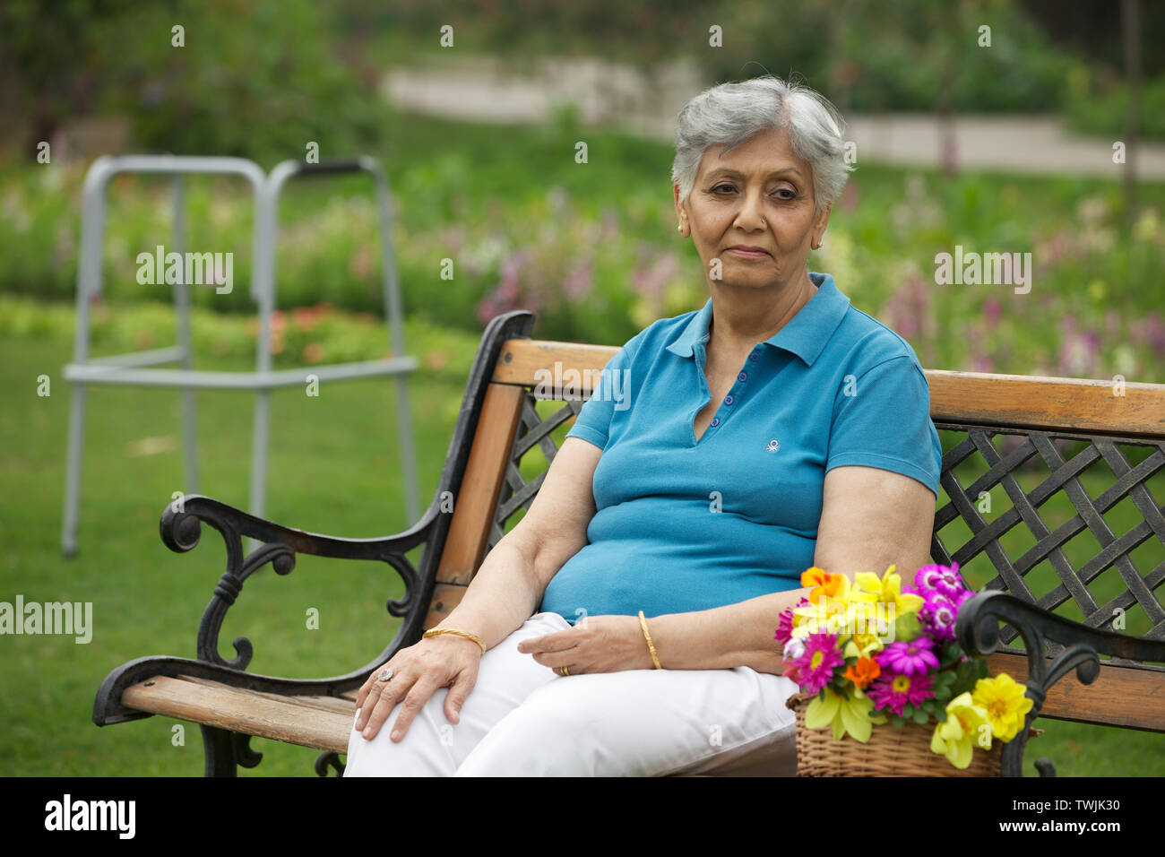 Indian old woman garden flower hi-res stock photography and images - Alamy