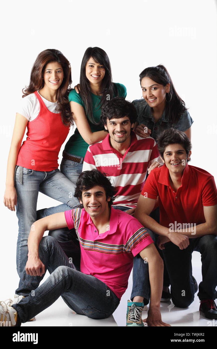 Group of friends smiling Stock Photo - Alamy