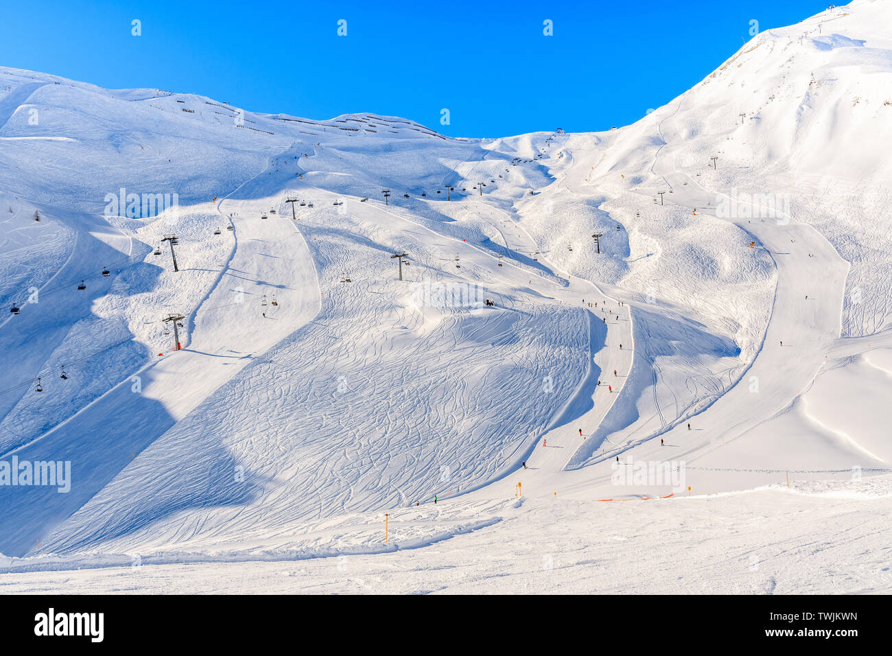 View of ski slope and amazing Austrian Alps mountains in beautiful ...