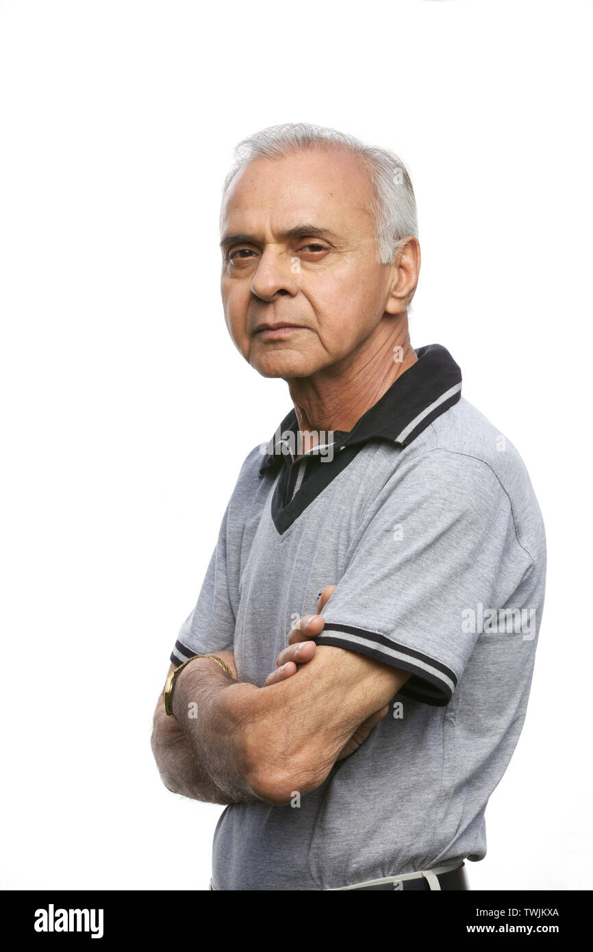 Portrait of an old man with arms crossed Stock Photo - Alamy