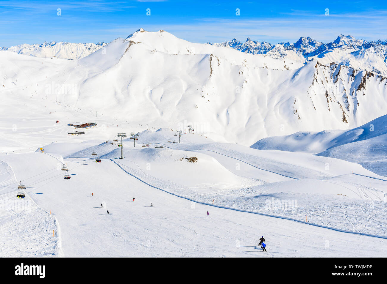 View of ski slope and amazing Austrian Alps mountains in beautiful ...