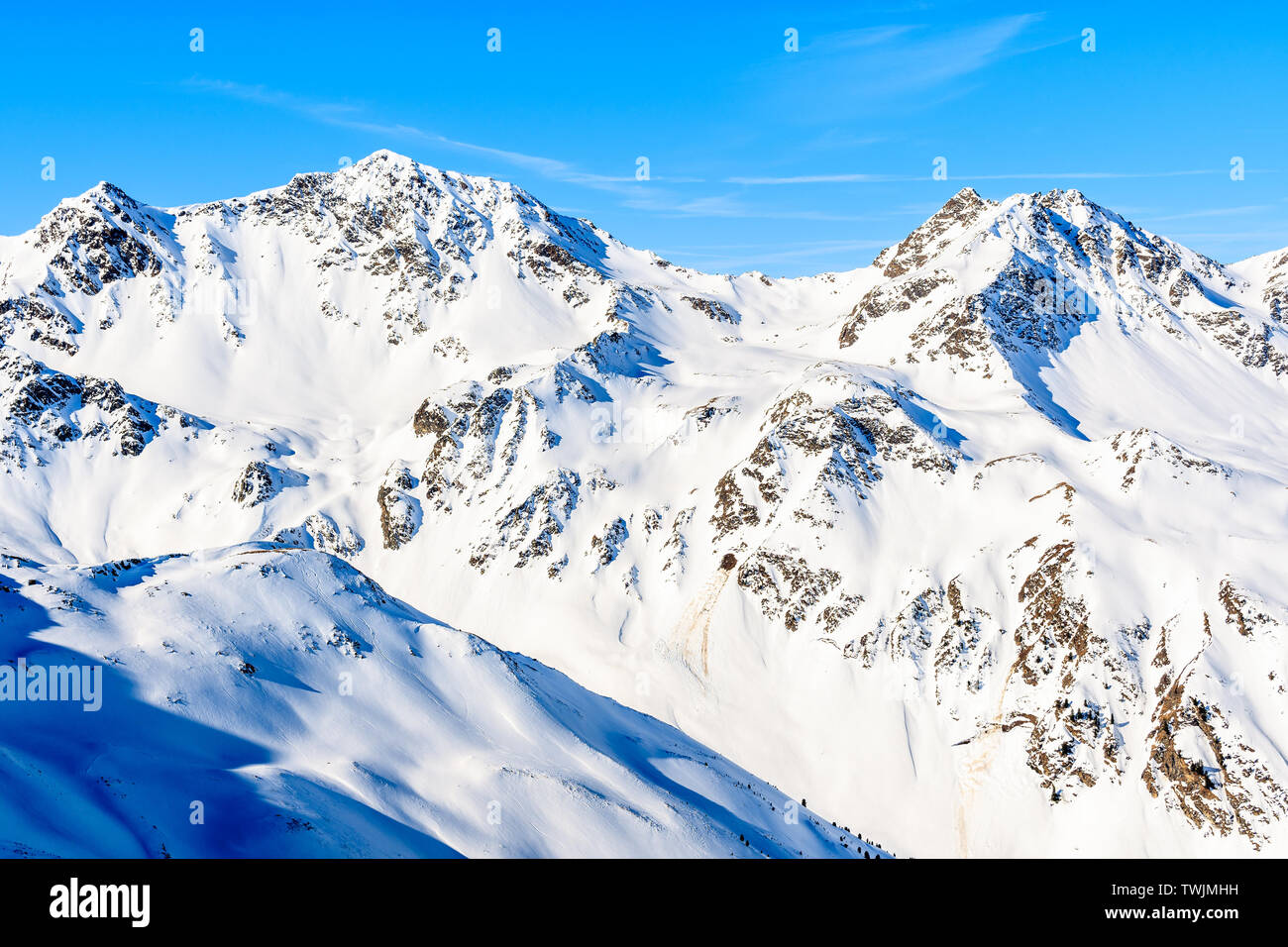View of ski slope and amazing Austrian Alps mountains in beautiful ...