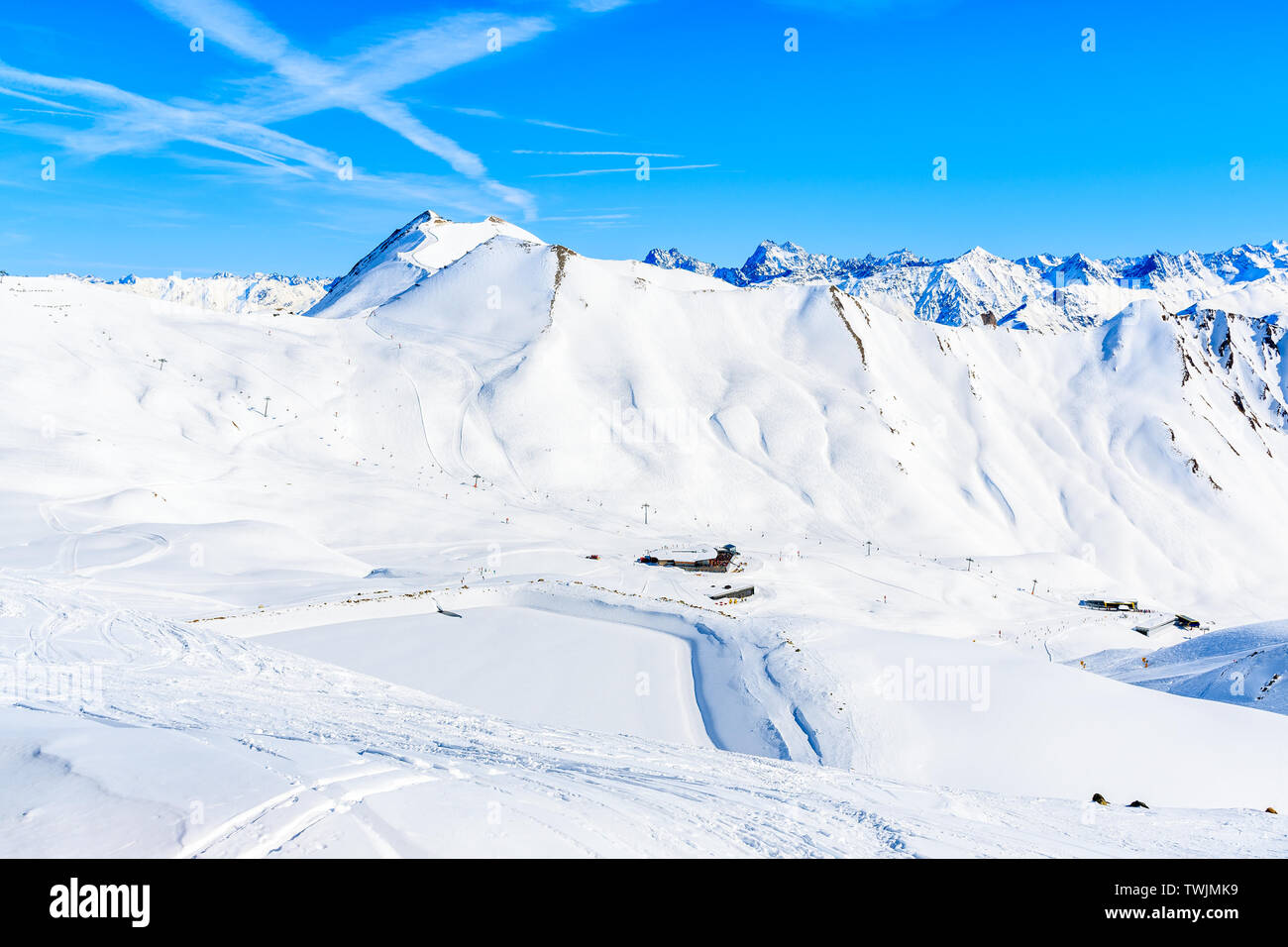 View of ski slope and amazing Austrian Alps mountains in beautiful ...