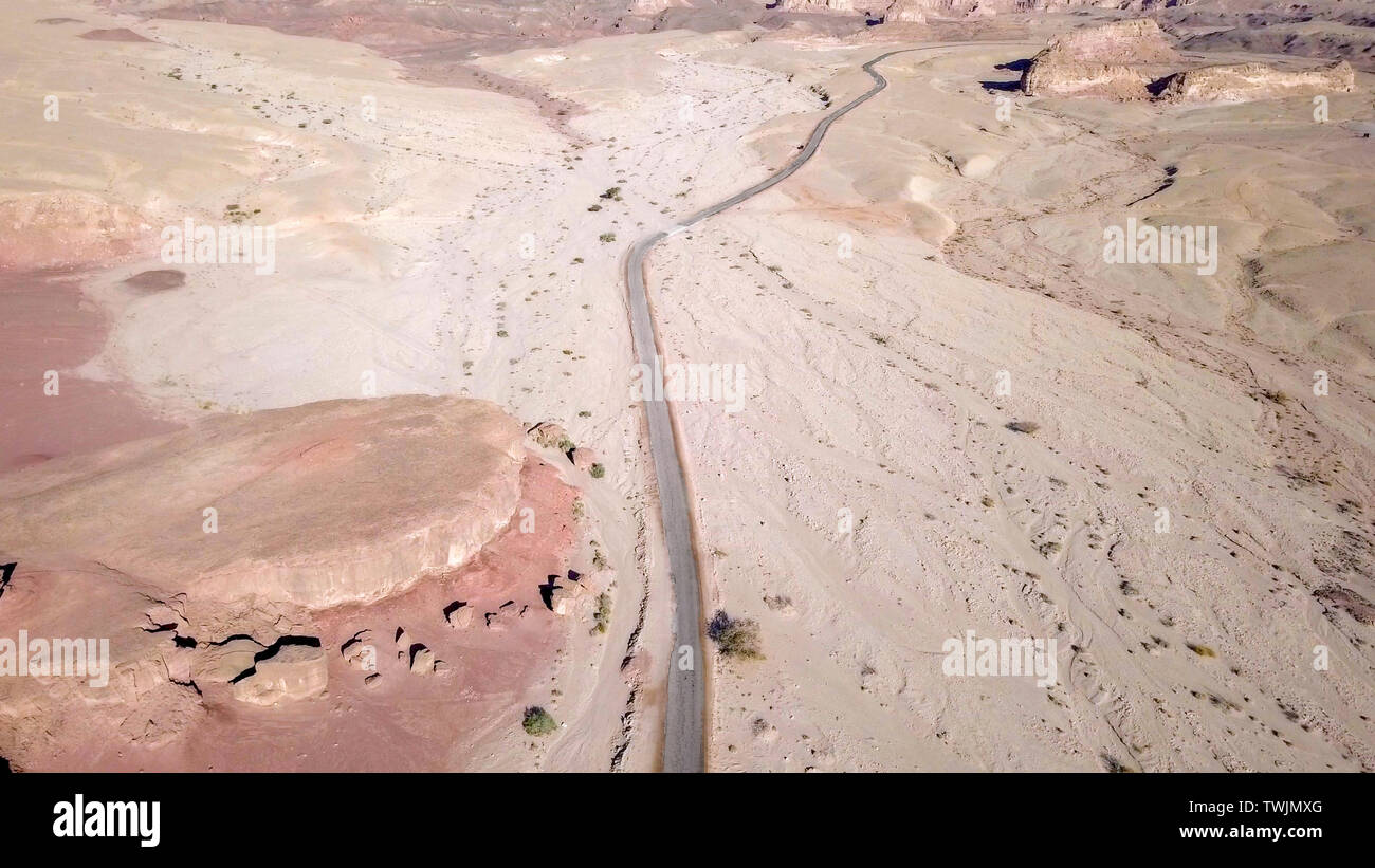 Old Desert road with cracked asphalt, Top down aerial image Stock Photo ...