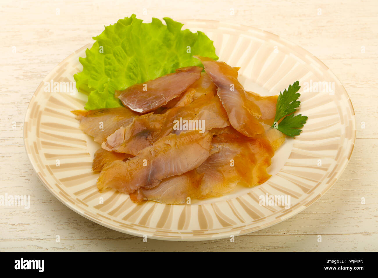 Smoked catfish fillet carpaccio Stock Photo - Alamy