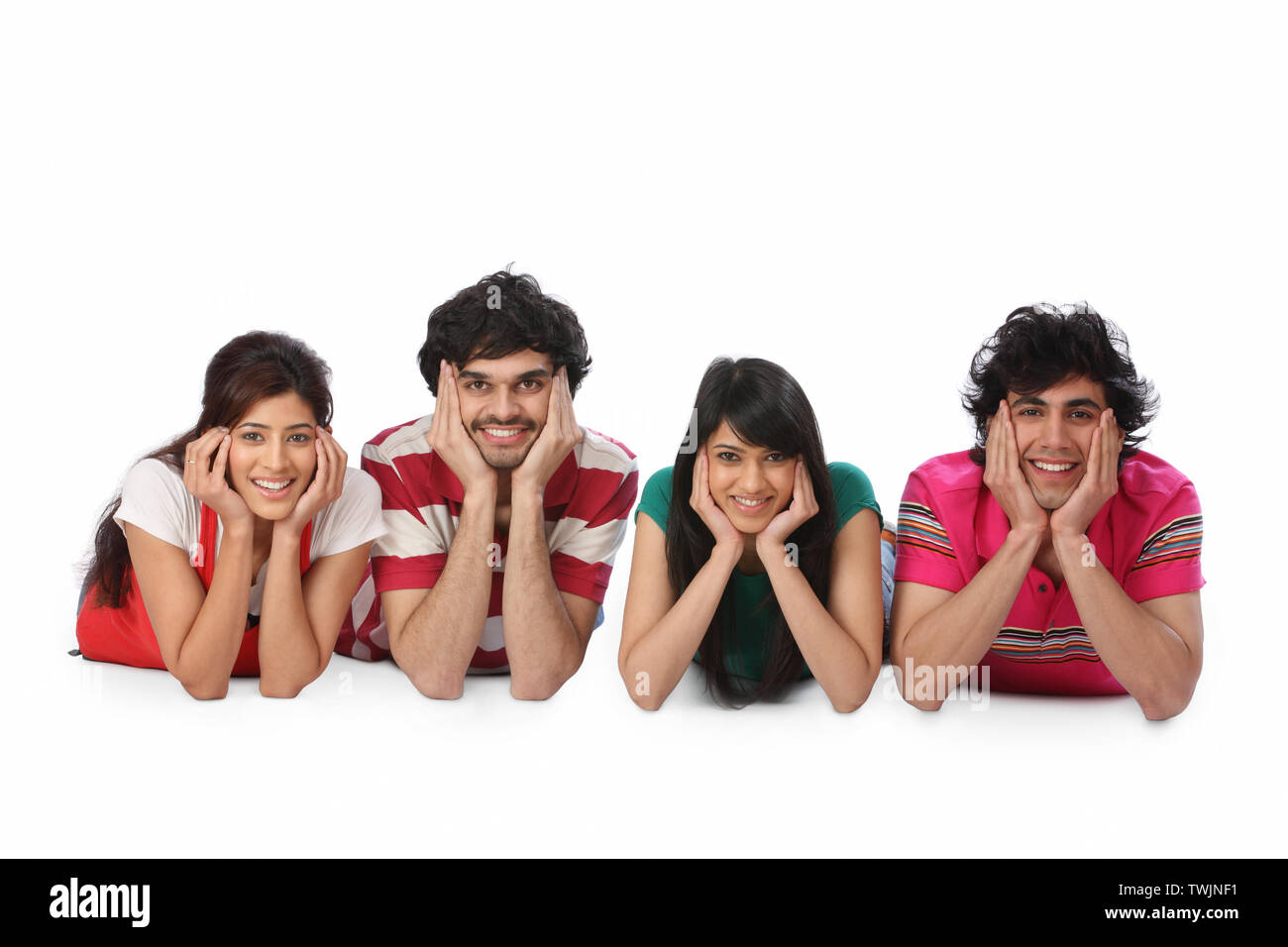 Group of friends lying down Stock Photo - Alamy