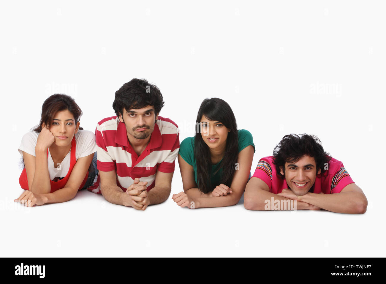 Group of friends lying down Stock Photo - Alamy