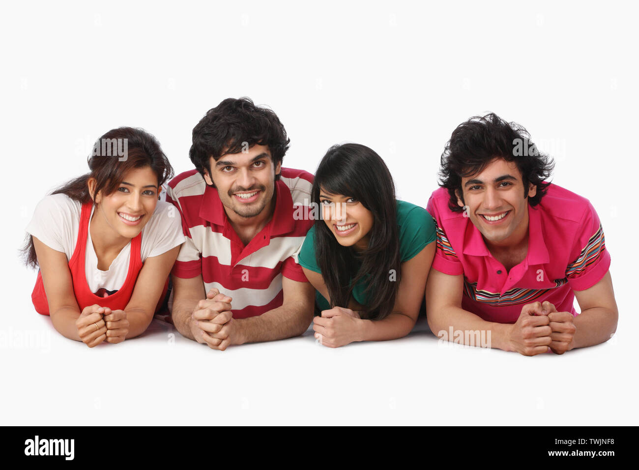 Group of friends lying down Stock Photo - Alamy