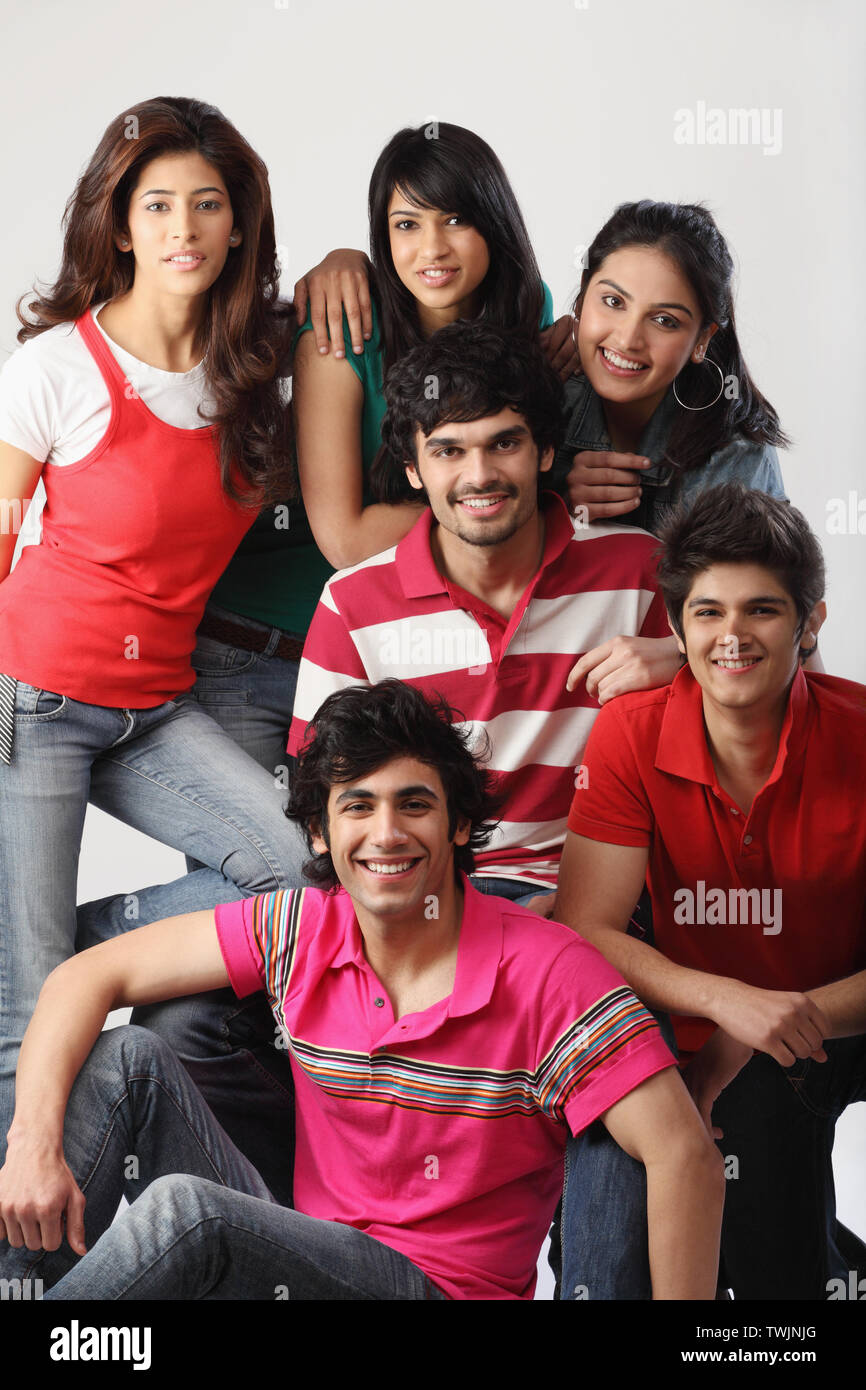 Group of friends smiling Stock Photo - Alamy