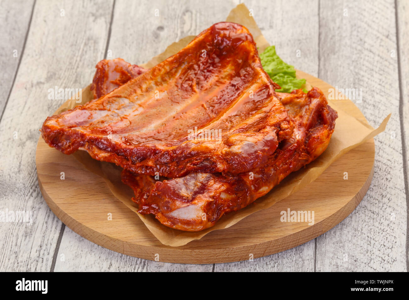 Raw marinated pork ribs ready for cooking Stock Photo - Alamy