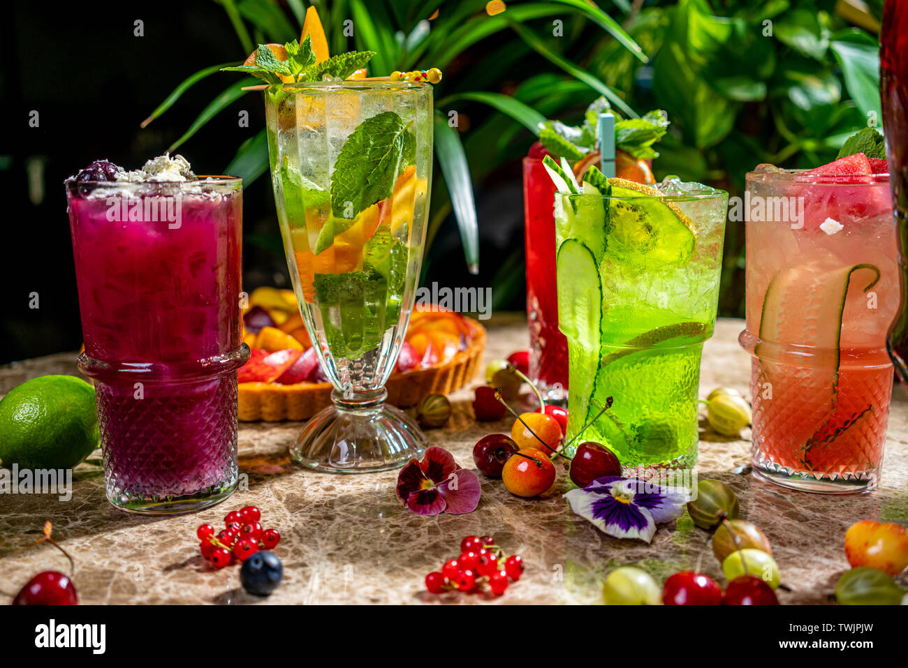 Colorful cocktails on the bar table in restaurant Stock Photo - Alamy