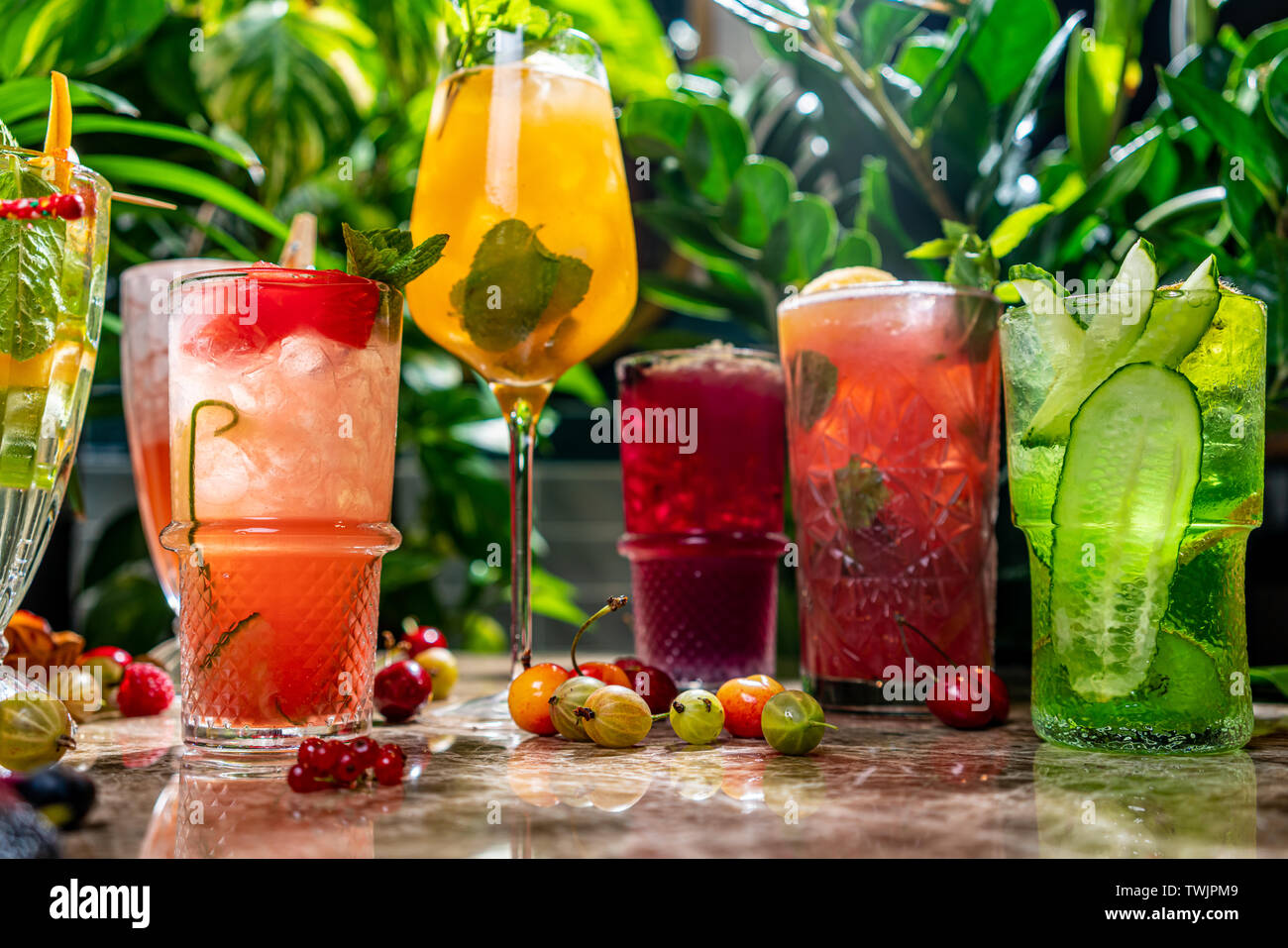 Colorful cocktails on the bar table in restaurant Stock Photo - Alamy