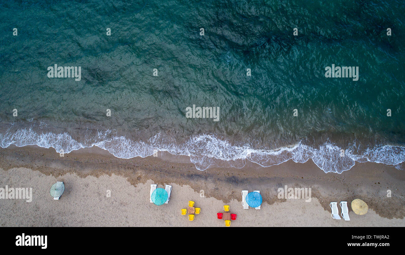 Aerial top view on the beach. Umbrellas, sand and ocean Stock Photo - Alamy