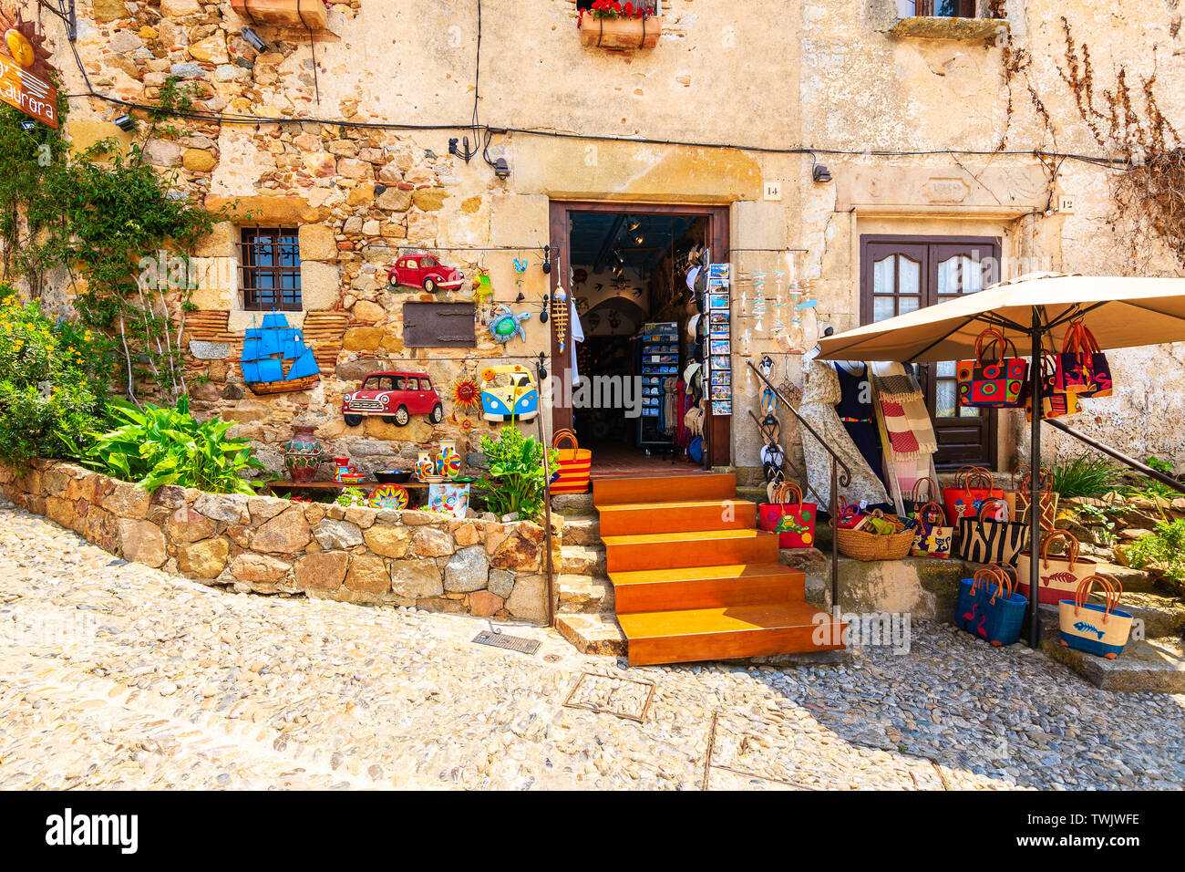 TOSSA DE MAR OLD TOWN, SPAIN - JUN 3, 2019: Shop with souvenirs and ...