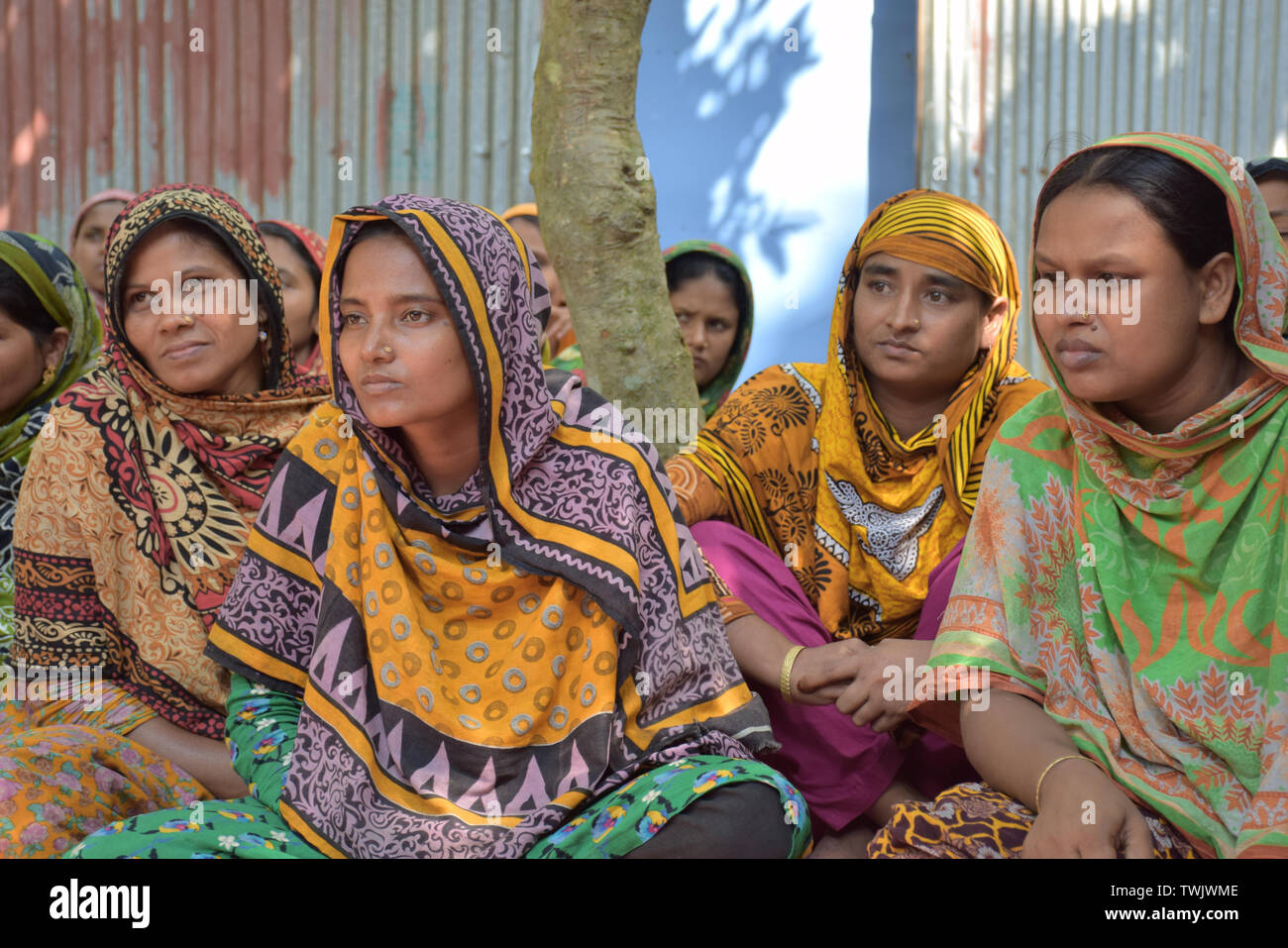 Bangladeshi village women are participating in a training provided by a ...