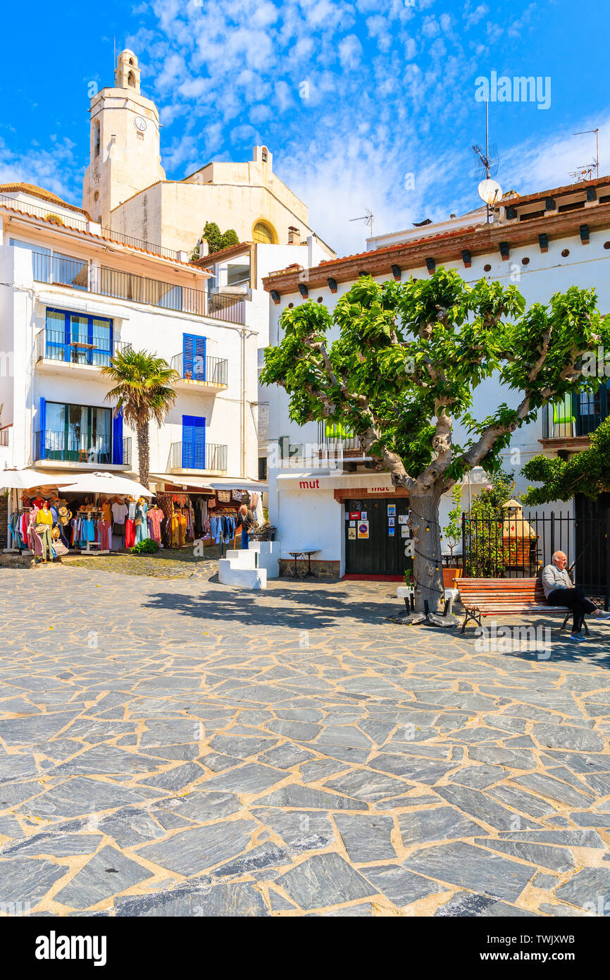 CADAQUES VILLAGE, SPAIN - JUN 4, 2019: Church square with restaurants ...