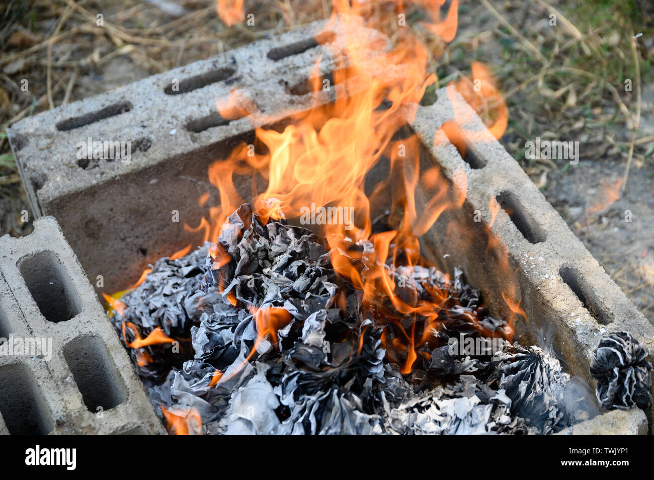 Burning paper for faith to the ancestors in chinese new year holidays ...