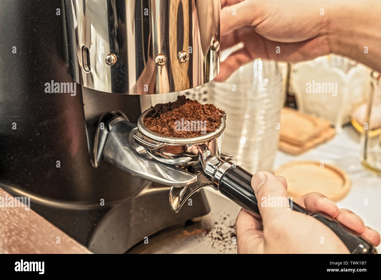Barista hands holding portafilter hi-res stock photography and images ...