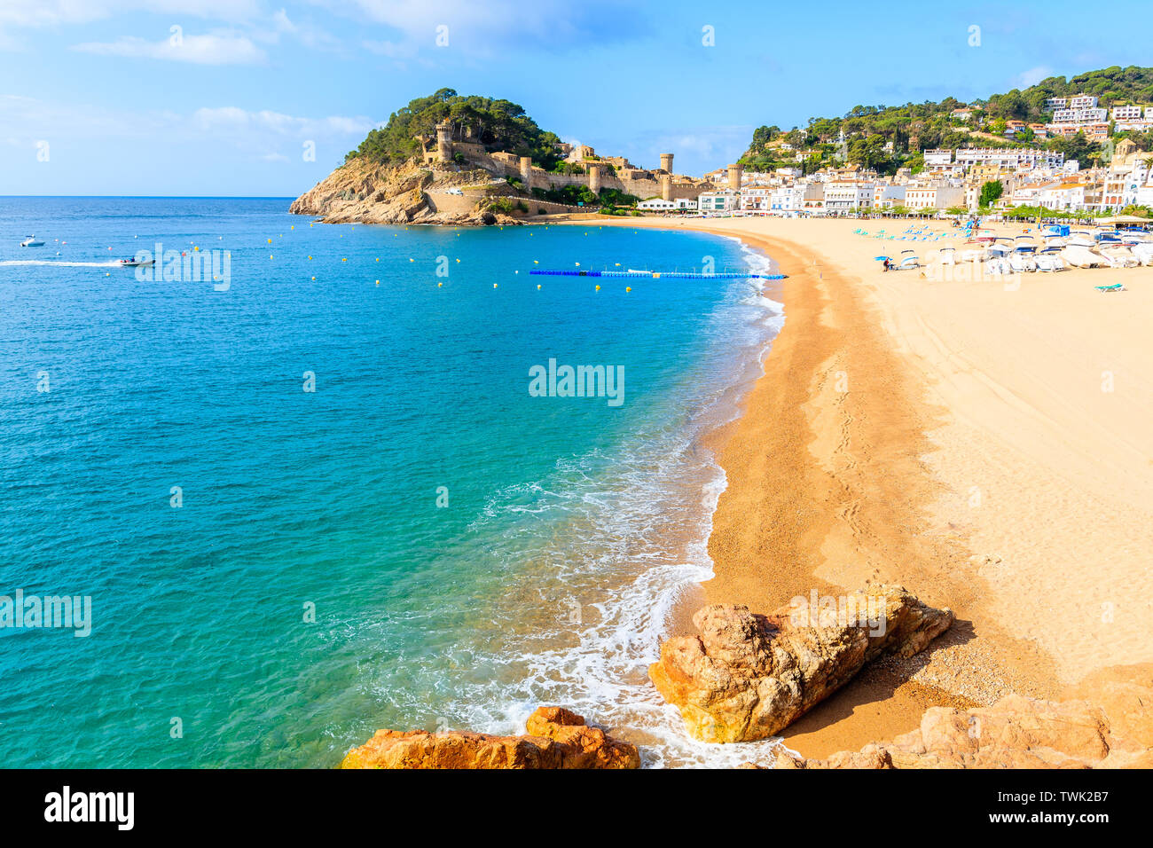 Blue azure sea and sandy beach view in Tossa de Mar, Costa Brava, Spain ...