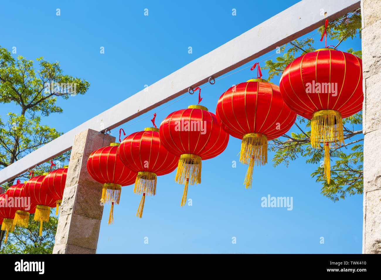 Red lanterns hanging high Stock Photo - Alamy